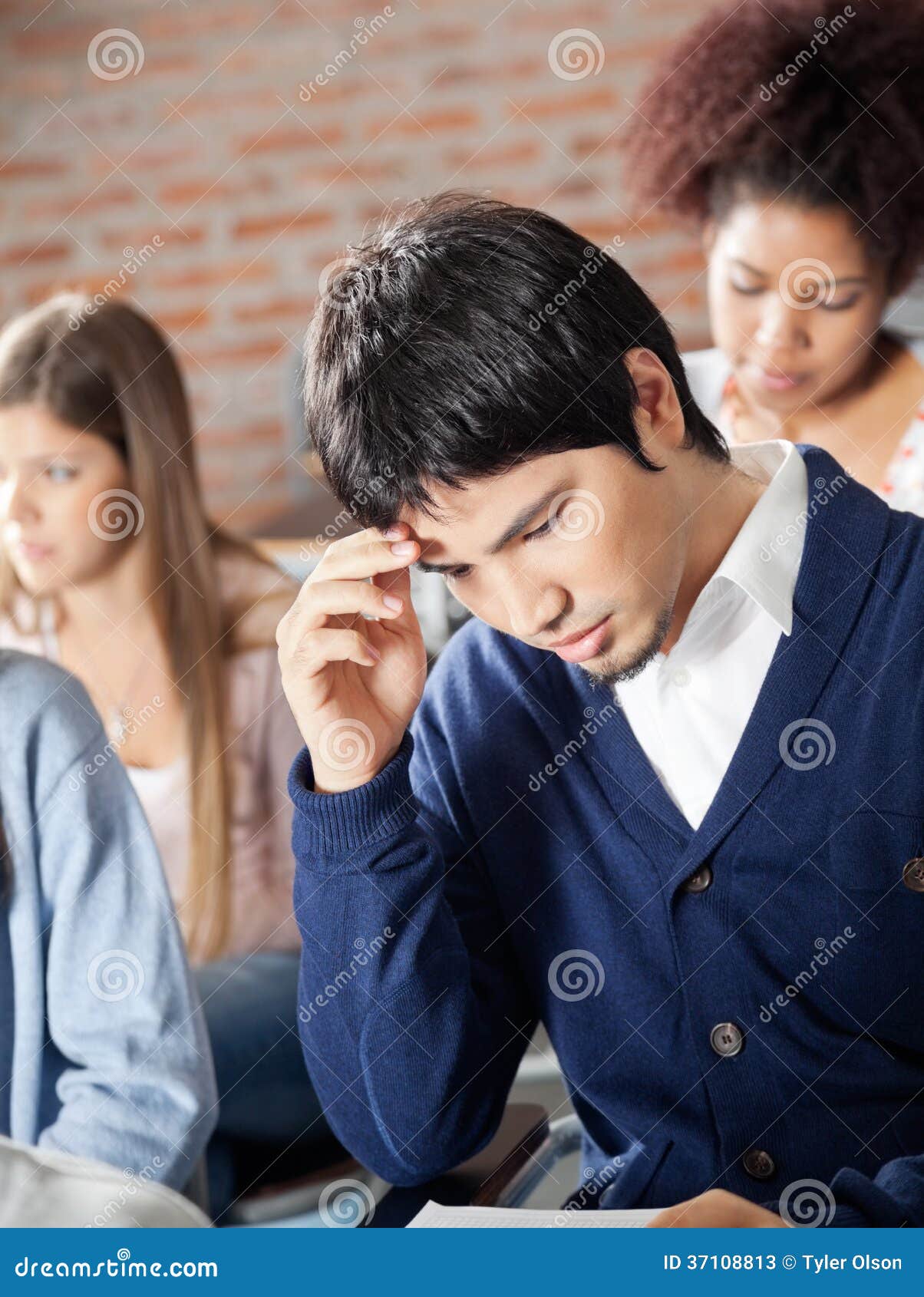 Student Thinking with Classmates in Classroom Stock Image - Image of ...