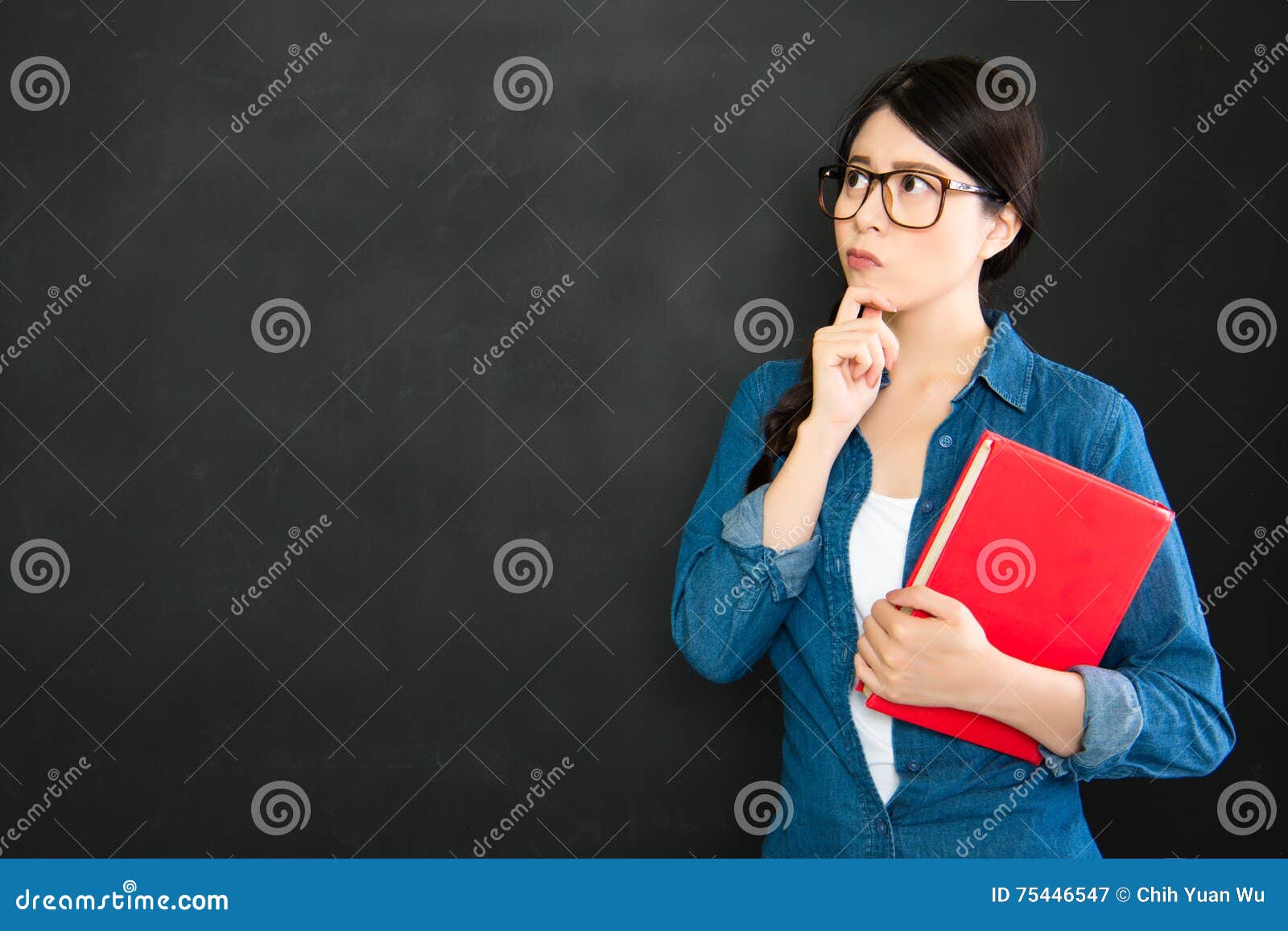 Student Thinking about Question of Assignment in Front of Blackboard ...