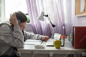 A Difficult School Assignment To Solve. a Teenage Girl Learns. Stock ...