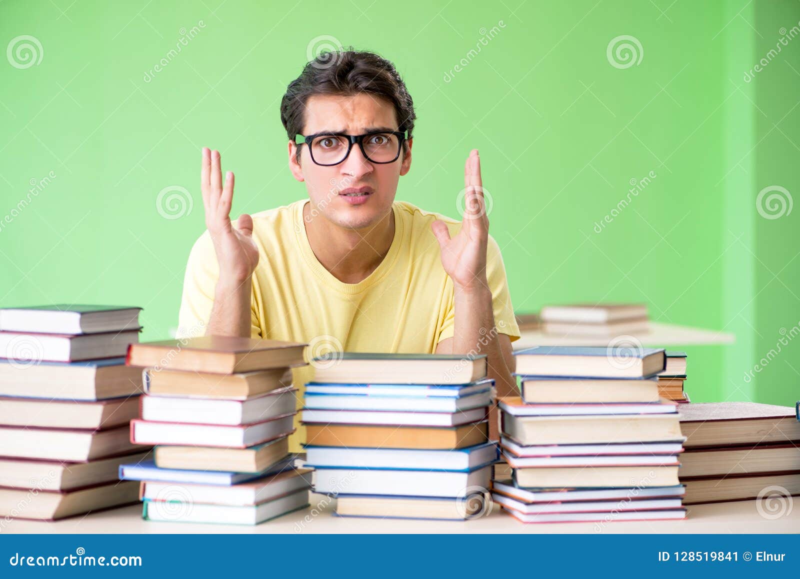 The Student with Too Many Books To Read before Exam Stock Image - Image ...