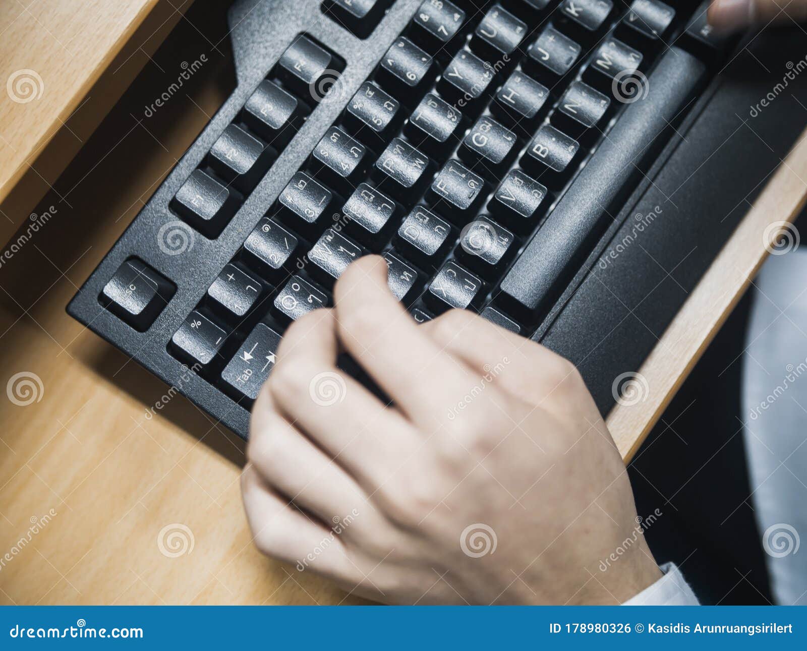 Student Typing His Work Using the Keyboard, Which Was Placed on the ...
