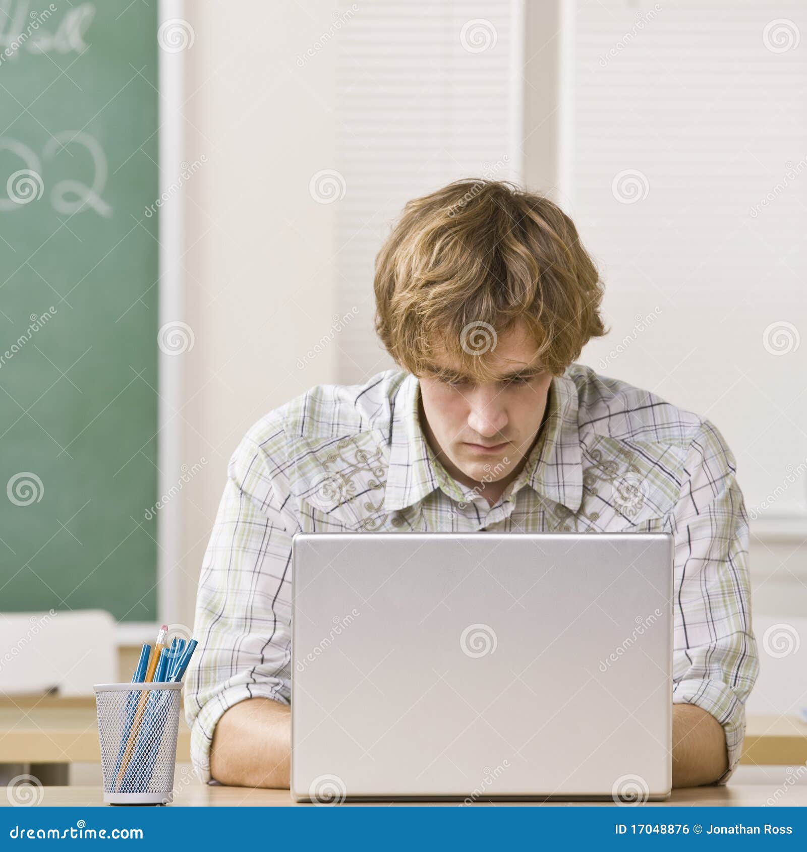 Student typing on laptop stock photo. Image of typist - 17048876