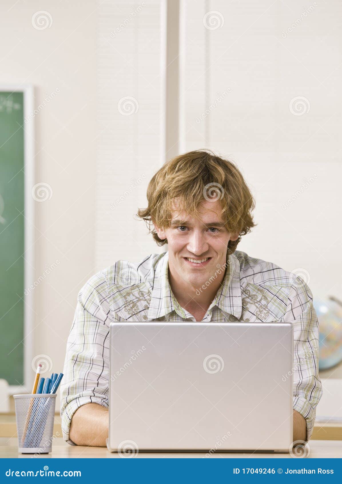 Student typing on laptop stock photo. Image of typist - 17049246