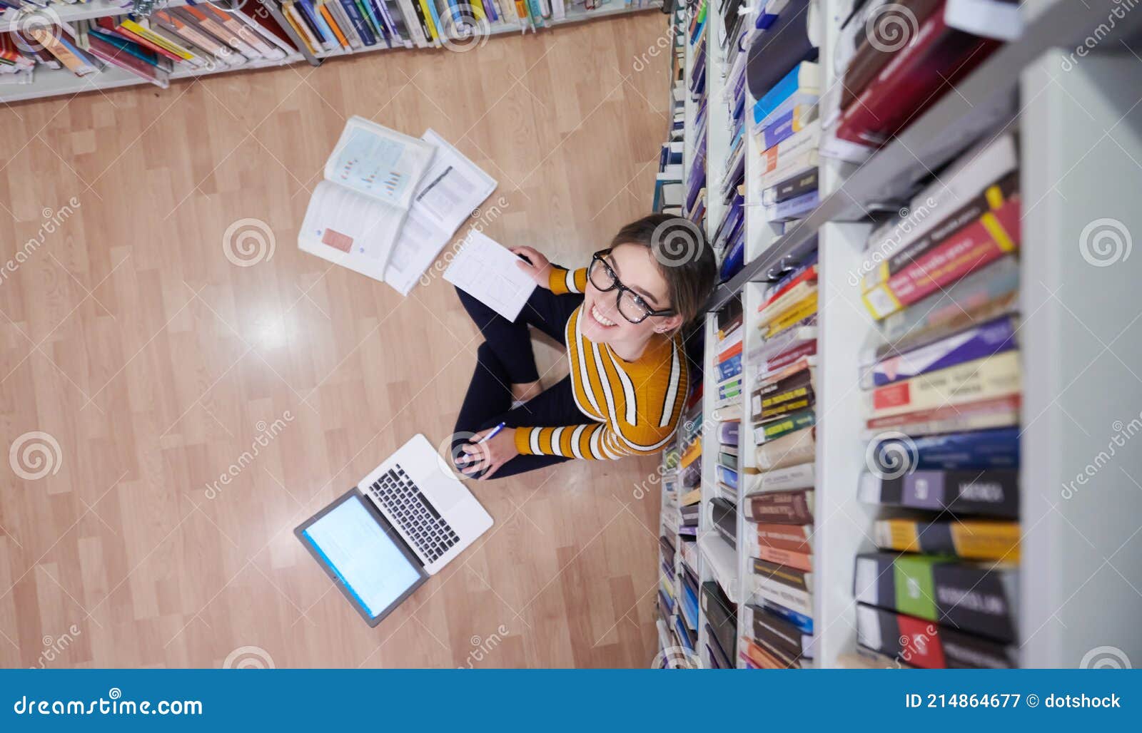 The Student Uses a Notebook and a School Library Stock Image - Image of ...