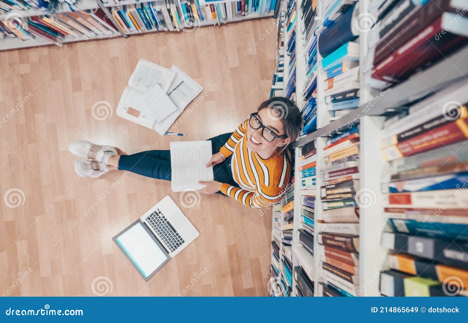 The Student Uses a Notebook and a School Library Stock Image - Image of ...
