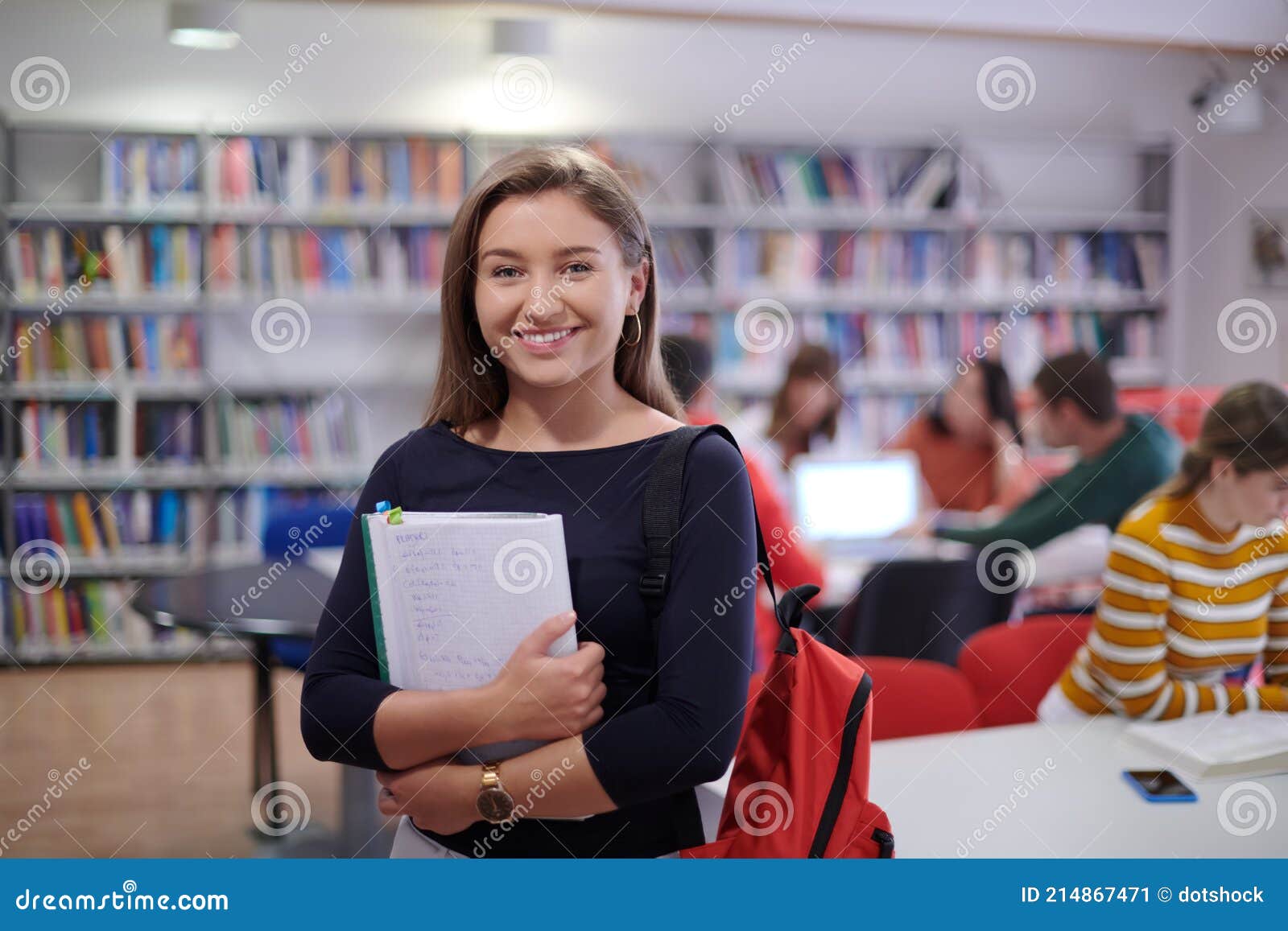 The Student Uses a Notebook and a School Library Stock Image - Image of ...