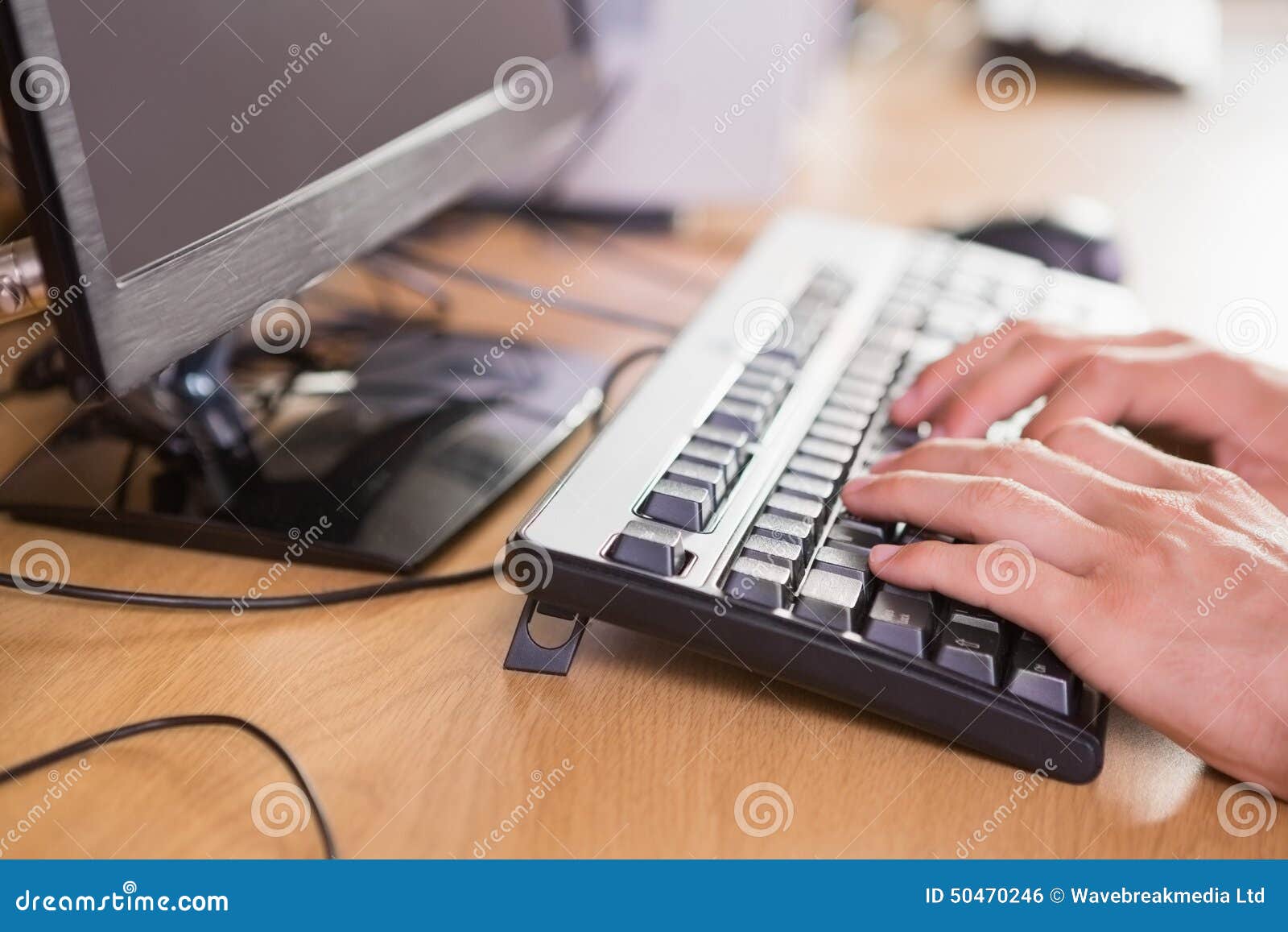 Student Using Computer in Classroom Stock Photo - Image of revising ...