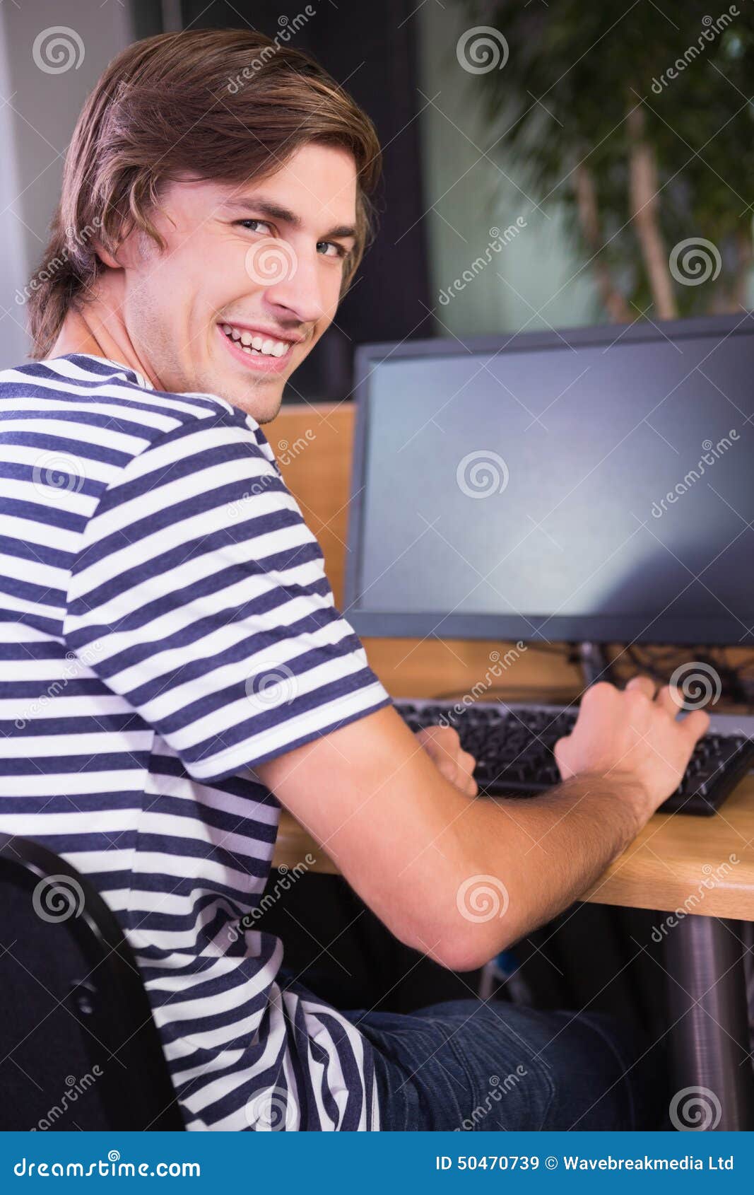 Student Using Computer in Classroom Stock Image - Image of cheerful ...