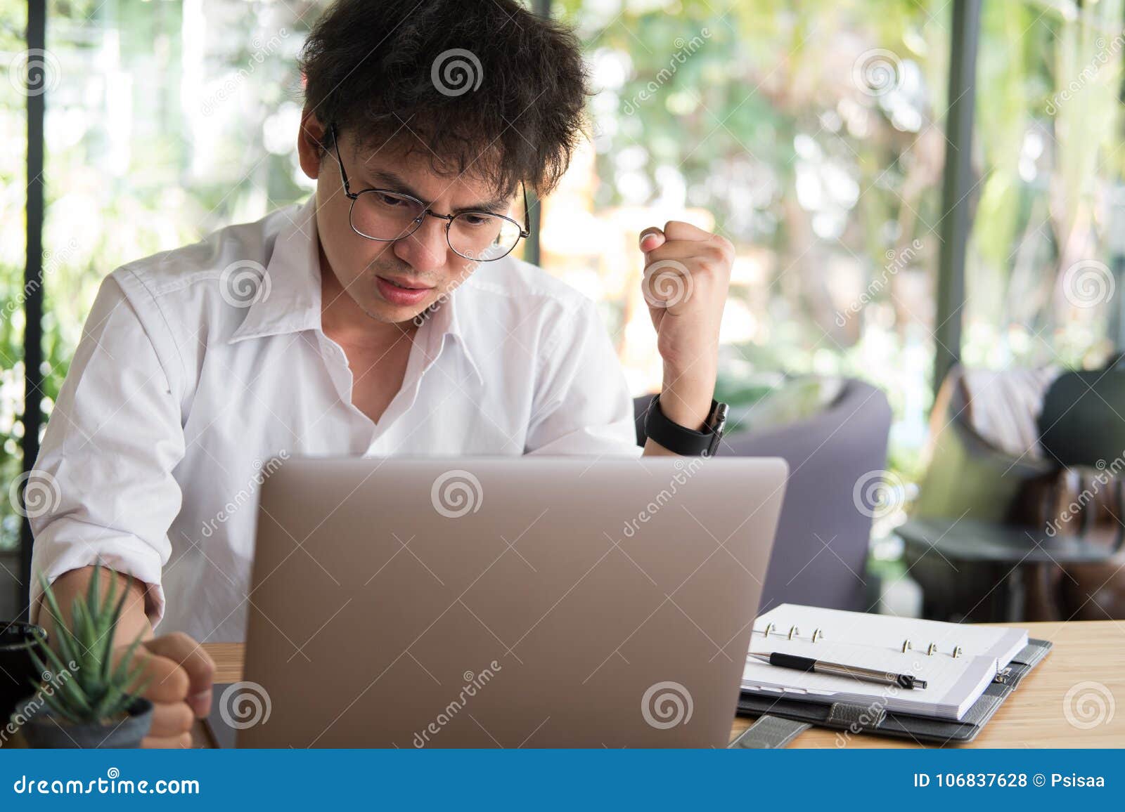 Student Using Computer for Learning Leasson Online at Cafe. Angry ...