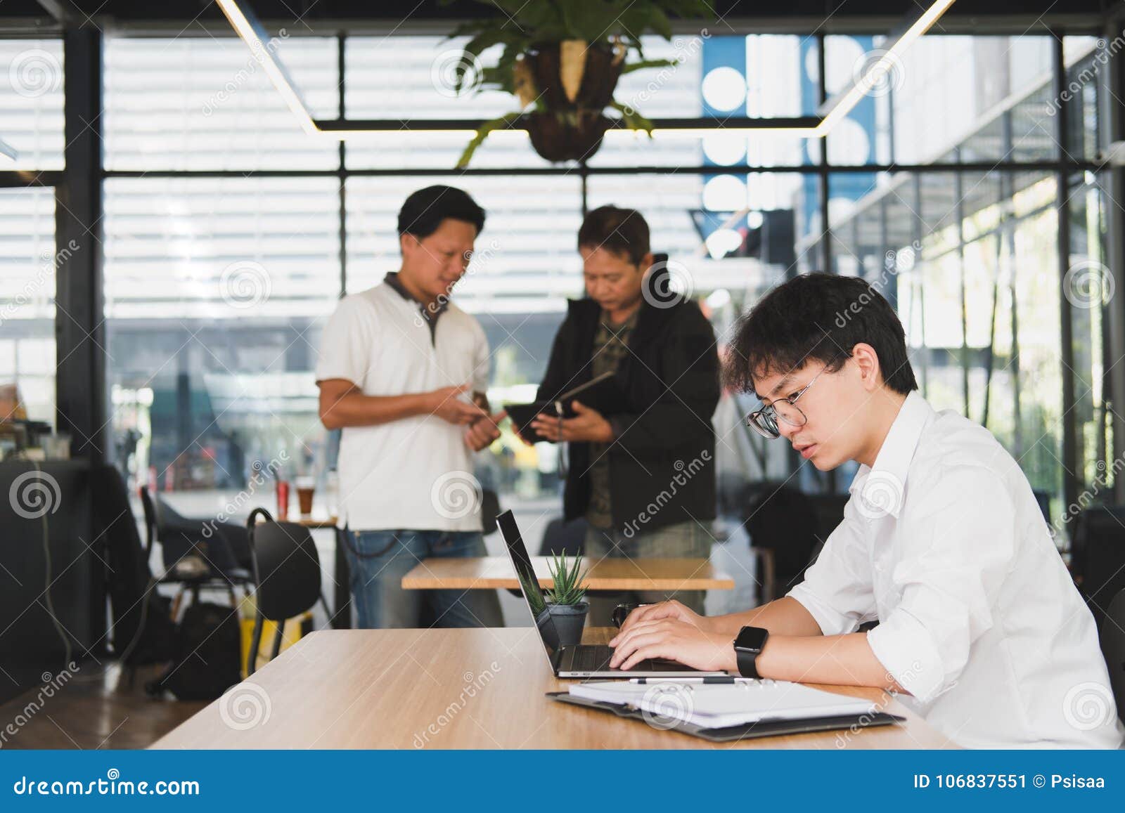 Student Using Computer for Learning Leasson Online at Cafe. Star Stock ...