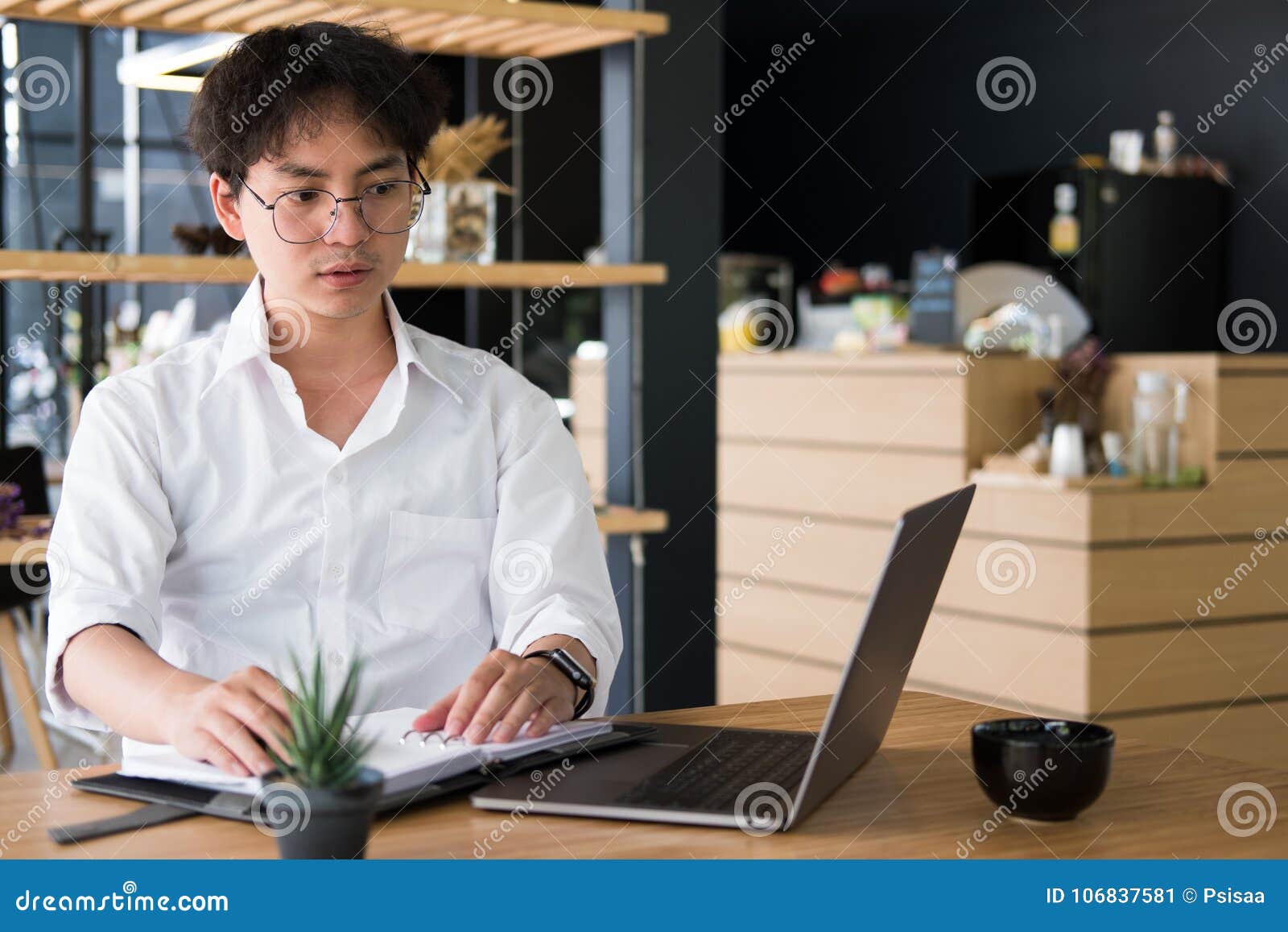 Student Using Computer for Learning Leasson Online at Cafe. Star Stock ...