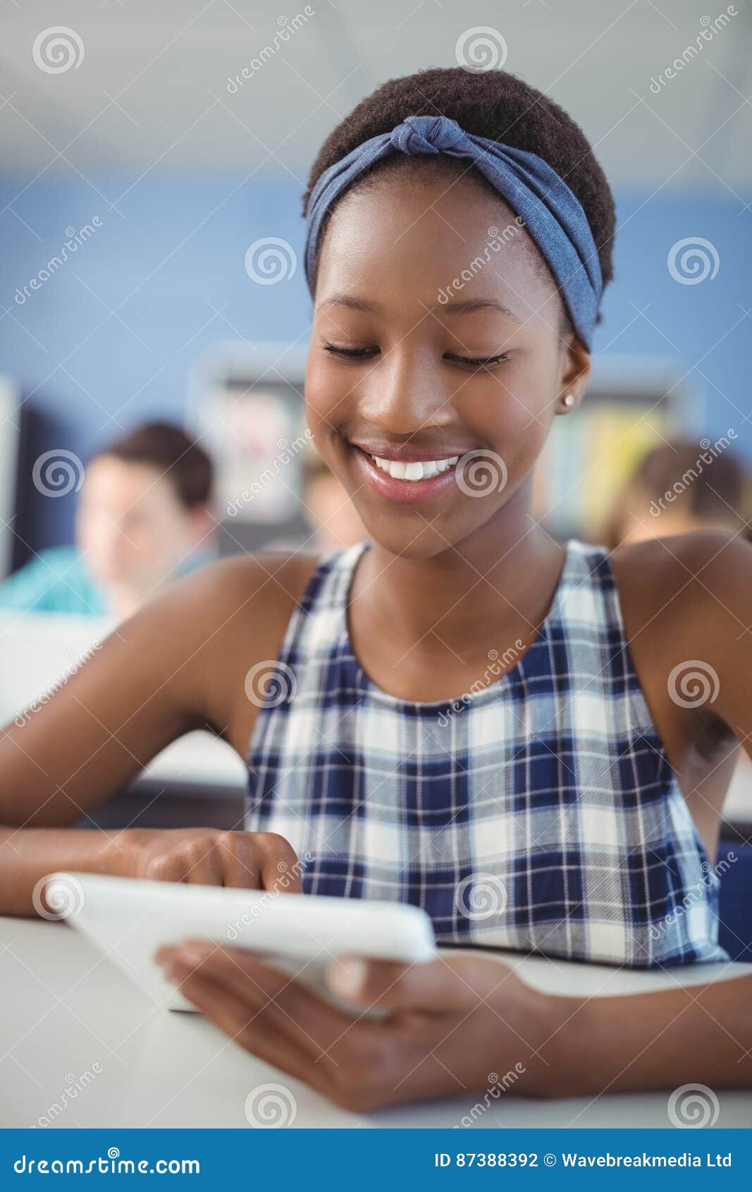 Student Using Digital Tablet in Classroom Stock Photo - Image of ...