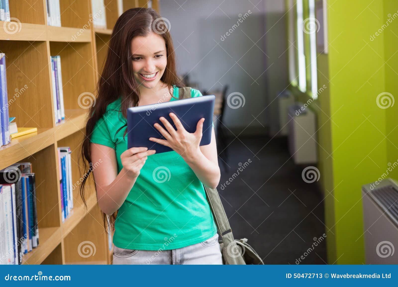Student Using Her Tablet in Library Stock Image - Image of college ...