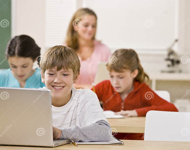 Student Using Laptop in Classroom Stock Photo - Image of caucasian ...