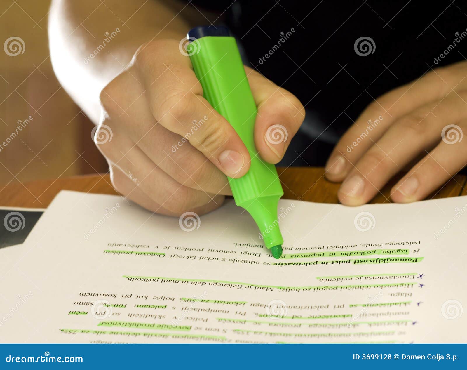 Student Using Marker To Mark Important Text Stock Photo - Image of ...