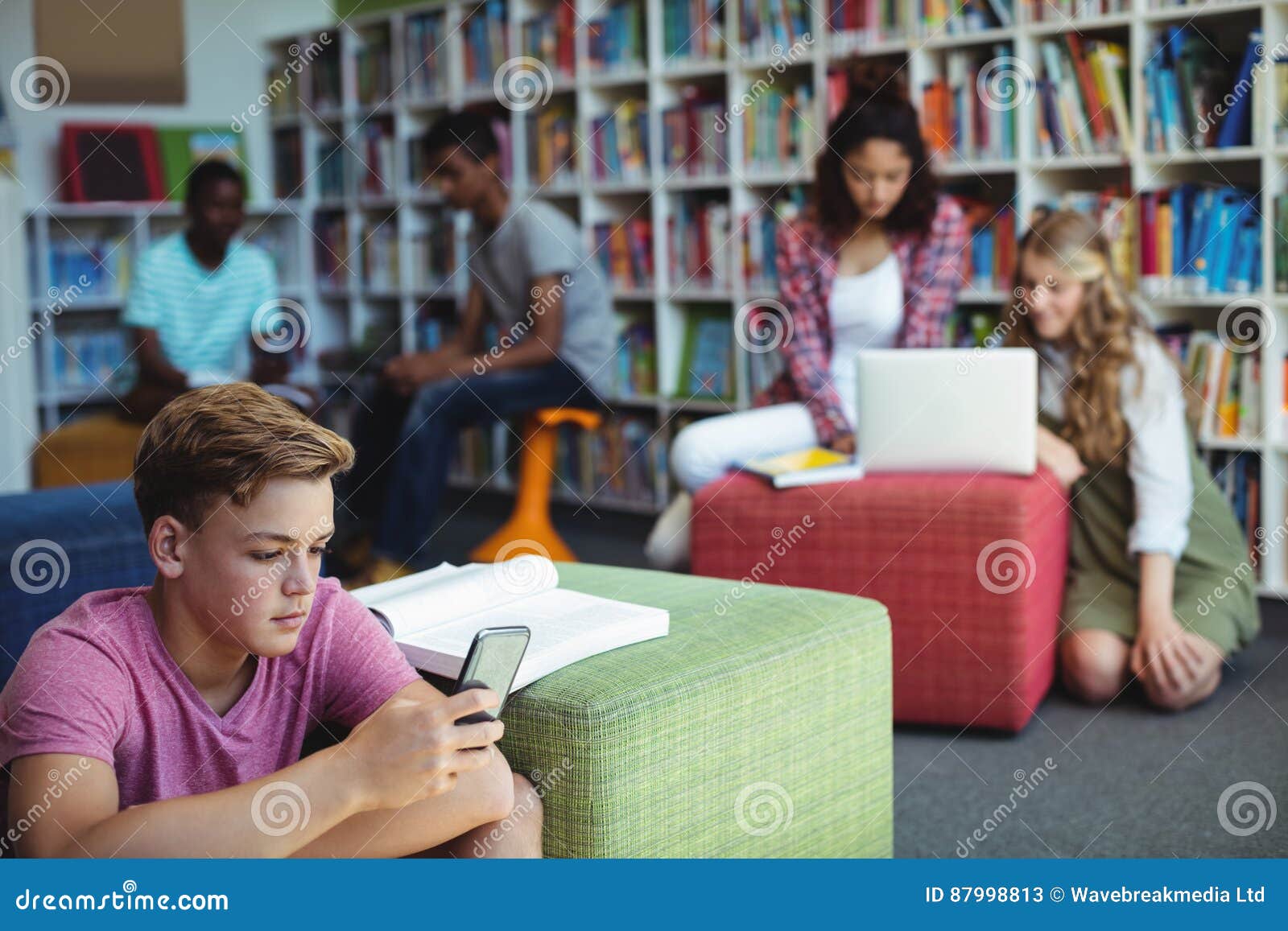 Student Using Mobile Phone in Library Stock Image - Image of female ...