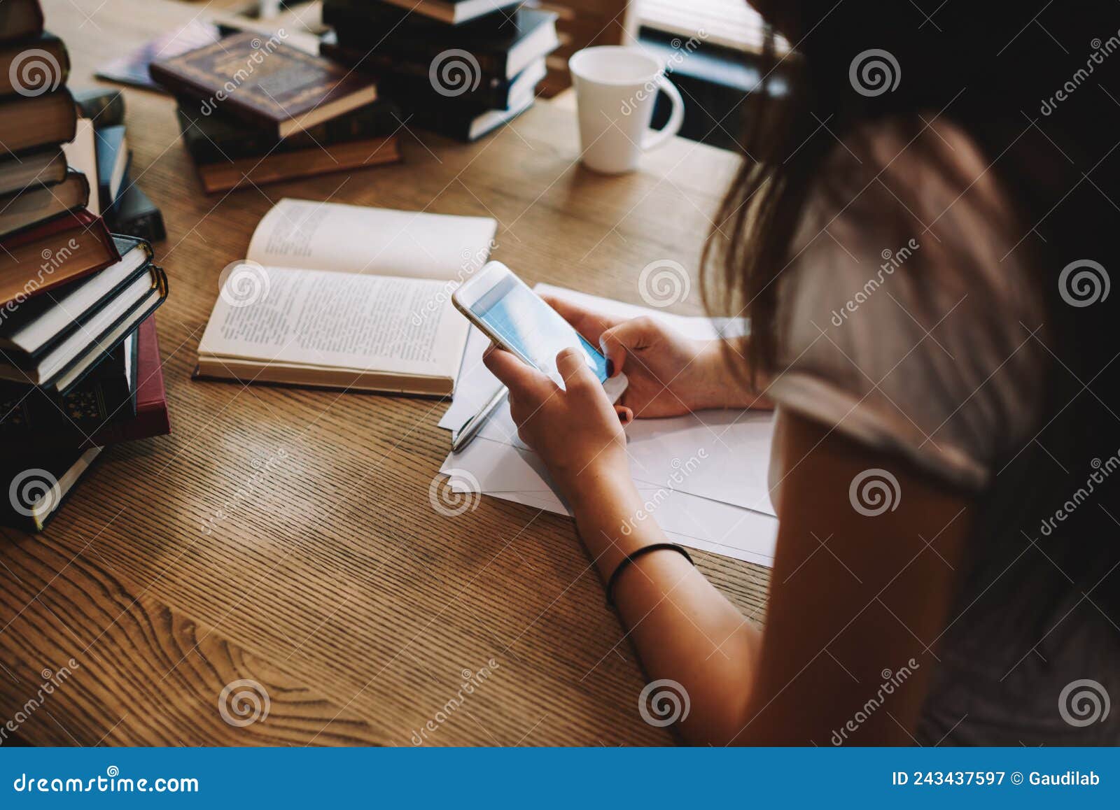 Student Using Mobile Phone while Preparing To Exam Stock Image - Image ...