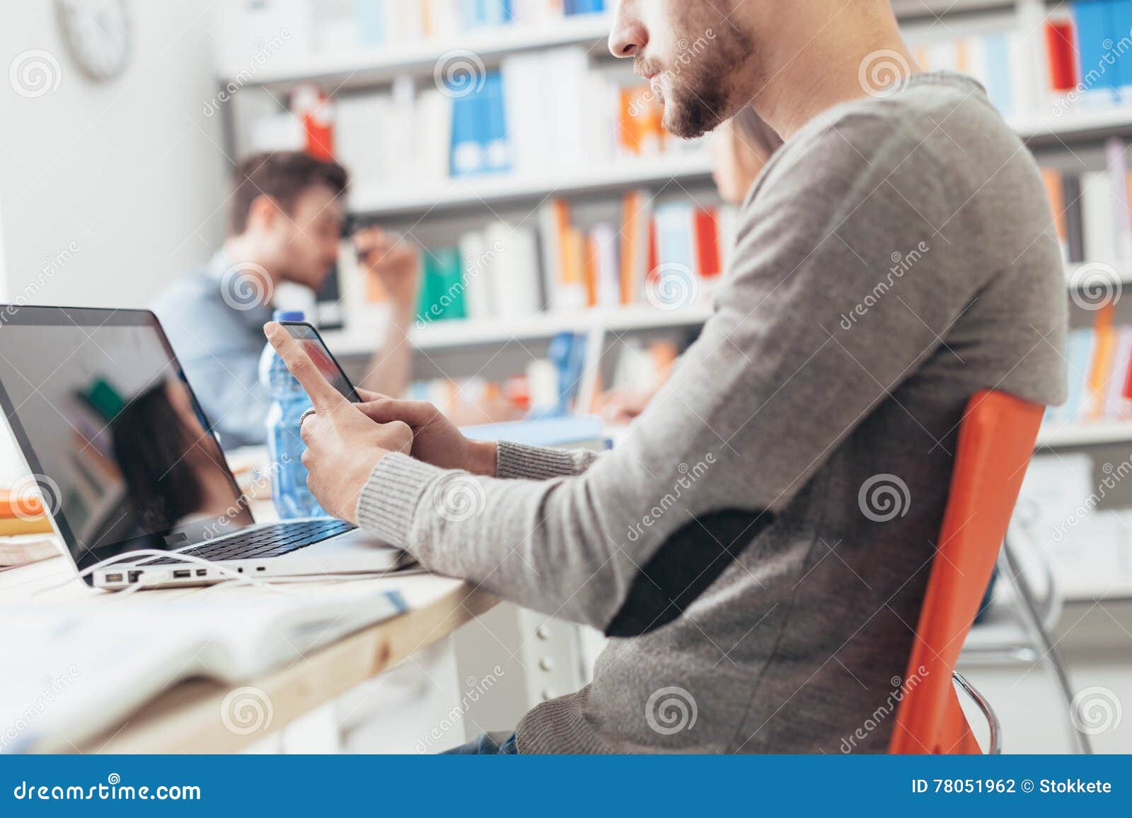 Student Using a Smart Phone in the Classroom Stock Photo - Image of ...