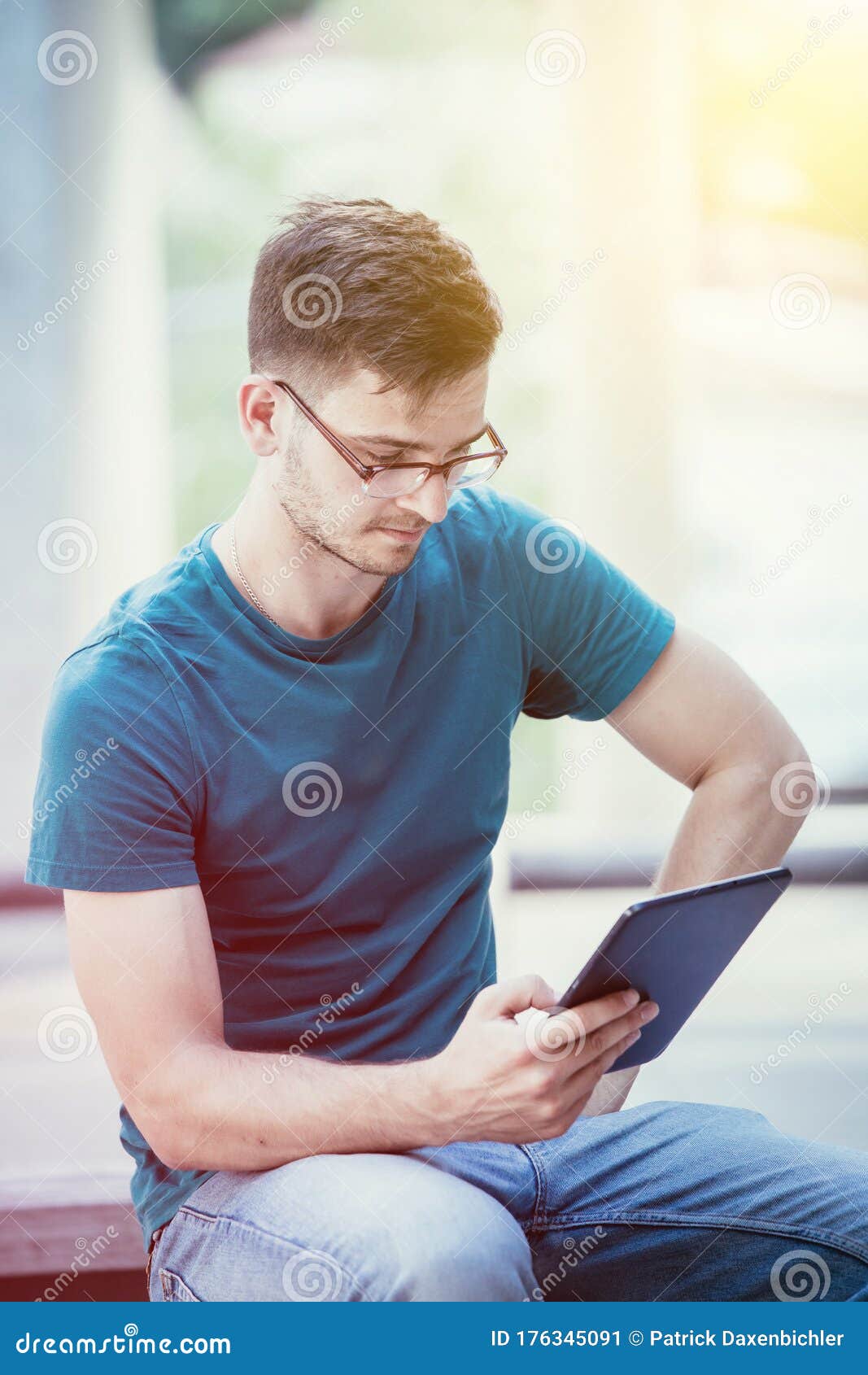 Student Using a Tablet Pc on the Campus. Outdoors, Urban Feeling ...