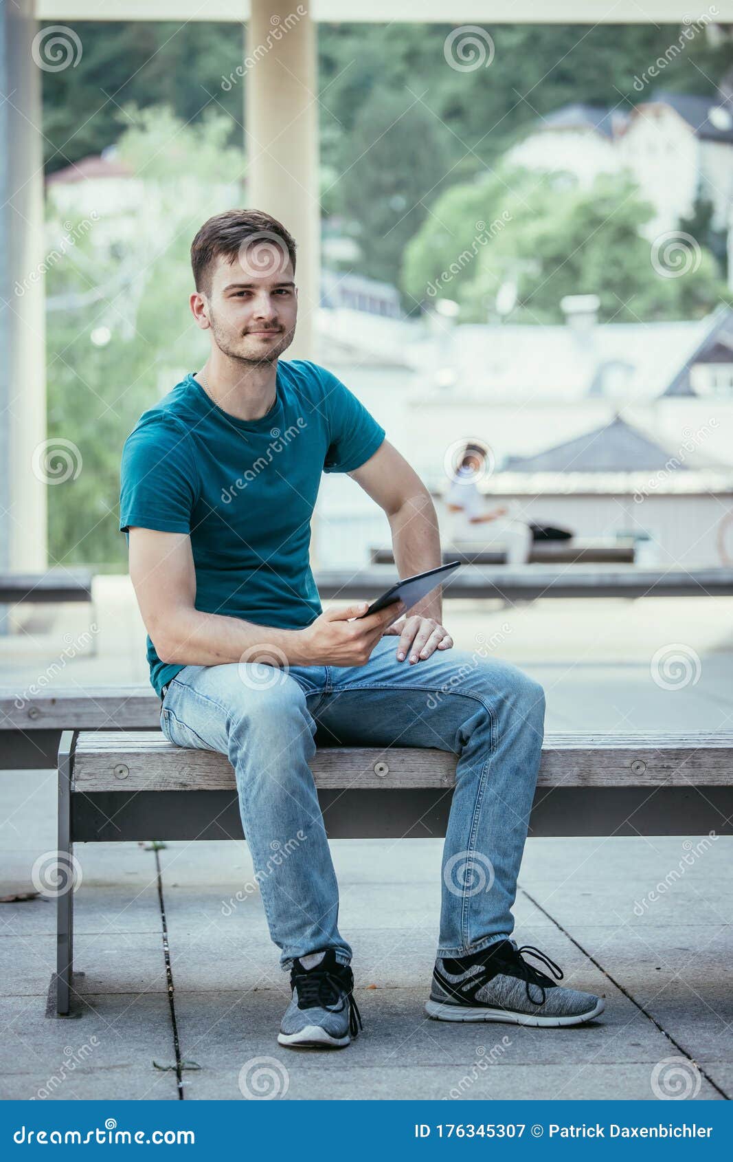 Student Using a Tablet Pc on the Campus. Outdoors, Urban Feeling ...