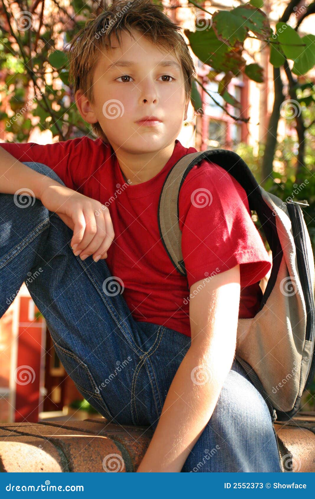 Student Waiting Outside School Stock Image - Image of jeans, scholastic ...