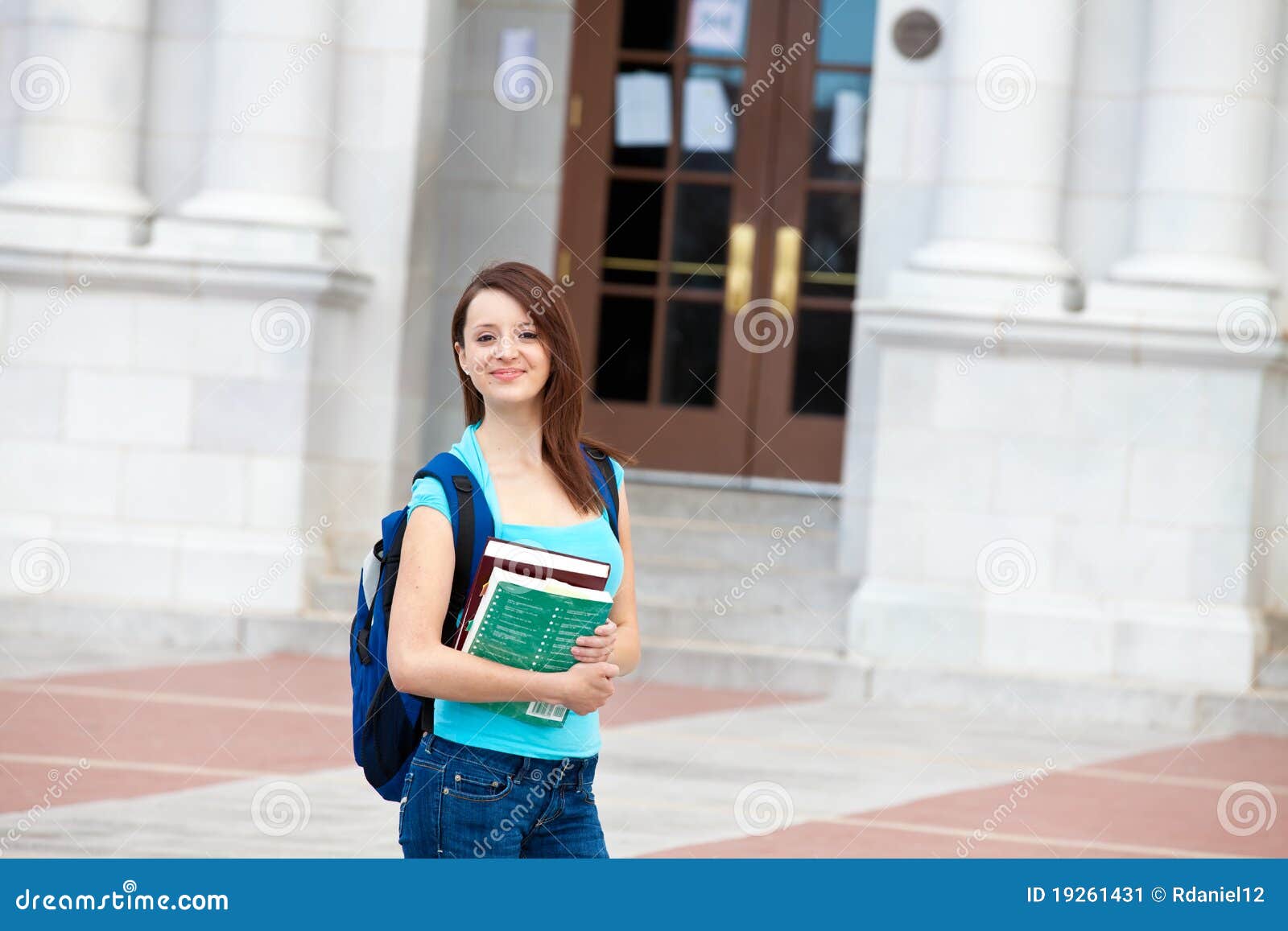 Student walking on campus stock image. Image of business - 19261431