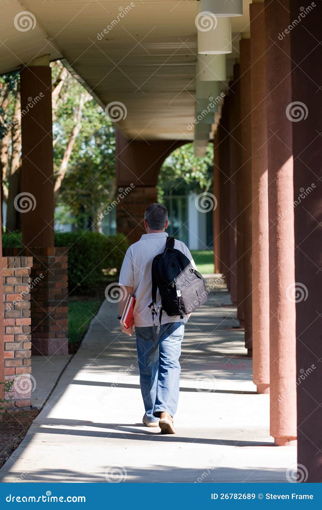 Student Walking To Class stock image. Image of university - 26782689