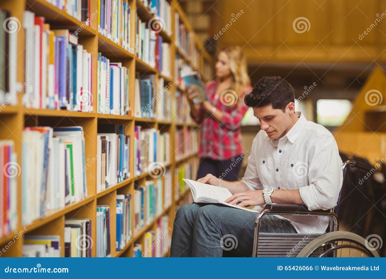 Student in Wheelchair Talking with Classmate Stock Photo - Image of ...