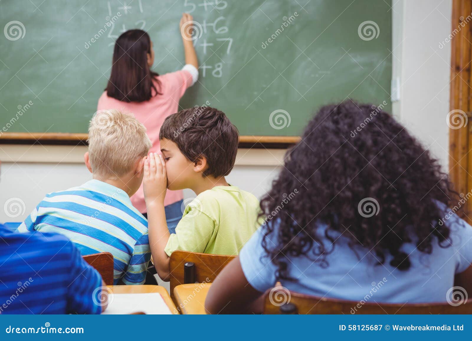 Student Whispering into Another Students Ear Stock Image - Image of ...