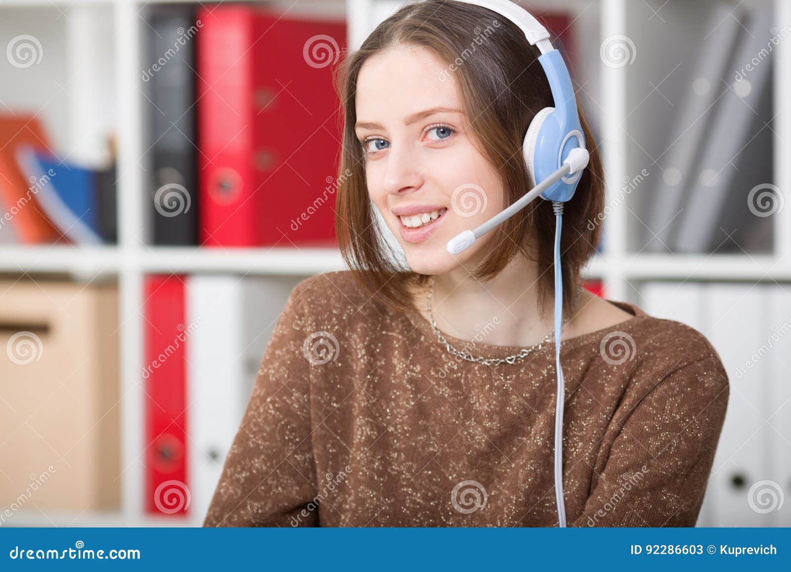 Student Woman Uses a Headset with a Microphone for Online Learning ...
