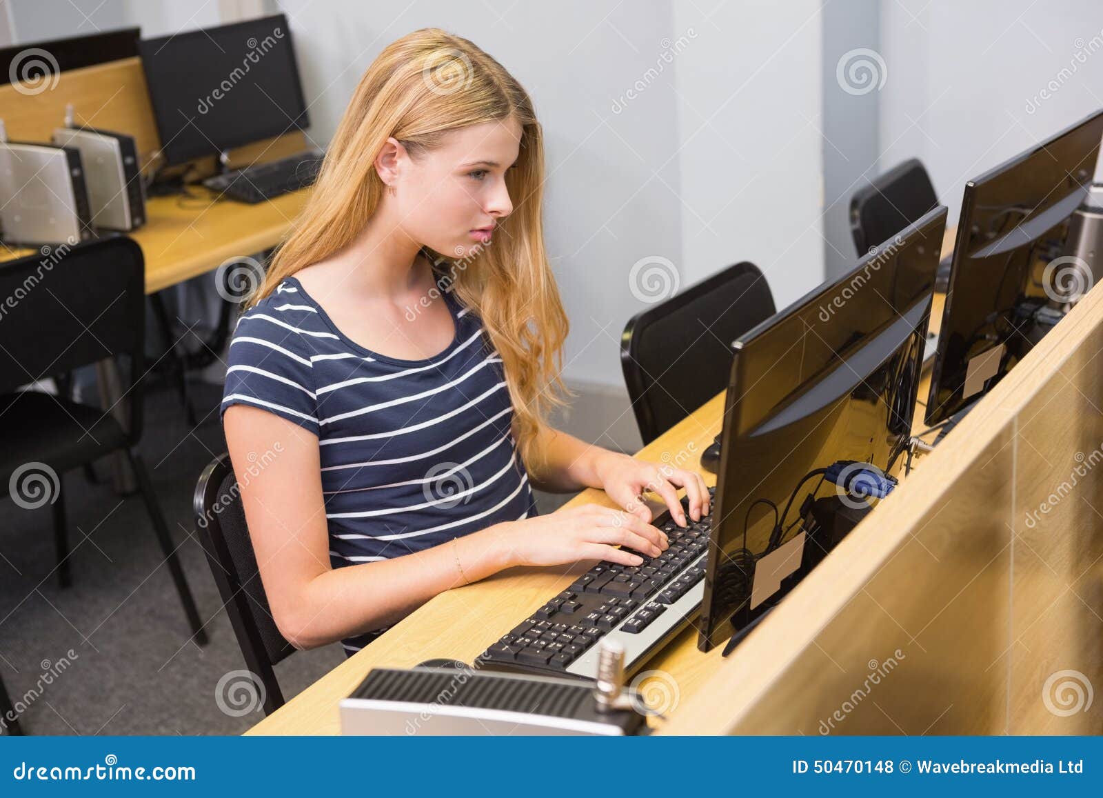 Student Working on Computer in Classroom Stock Photo - Image of ...