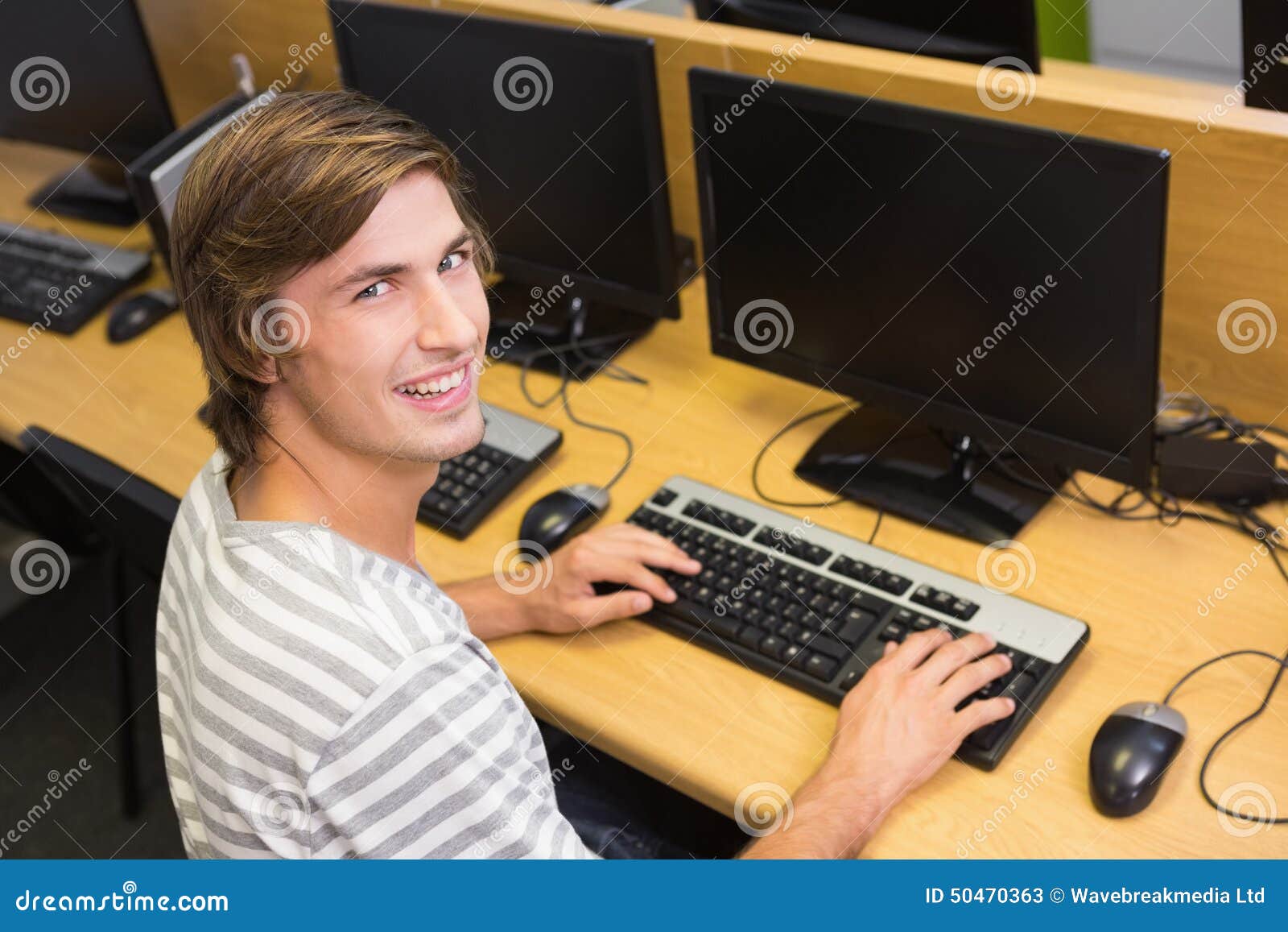 Student Working on Computer in Classroom Stock Image - Image of sitting ...