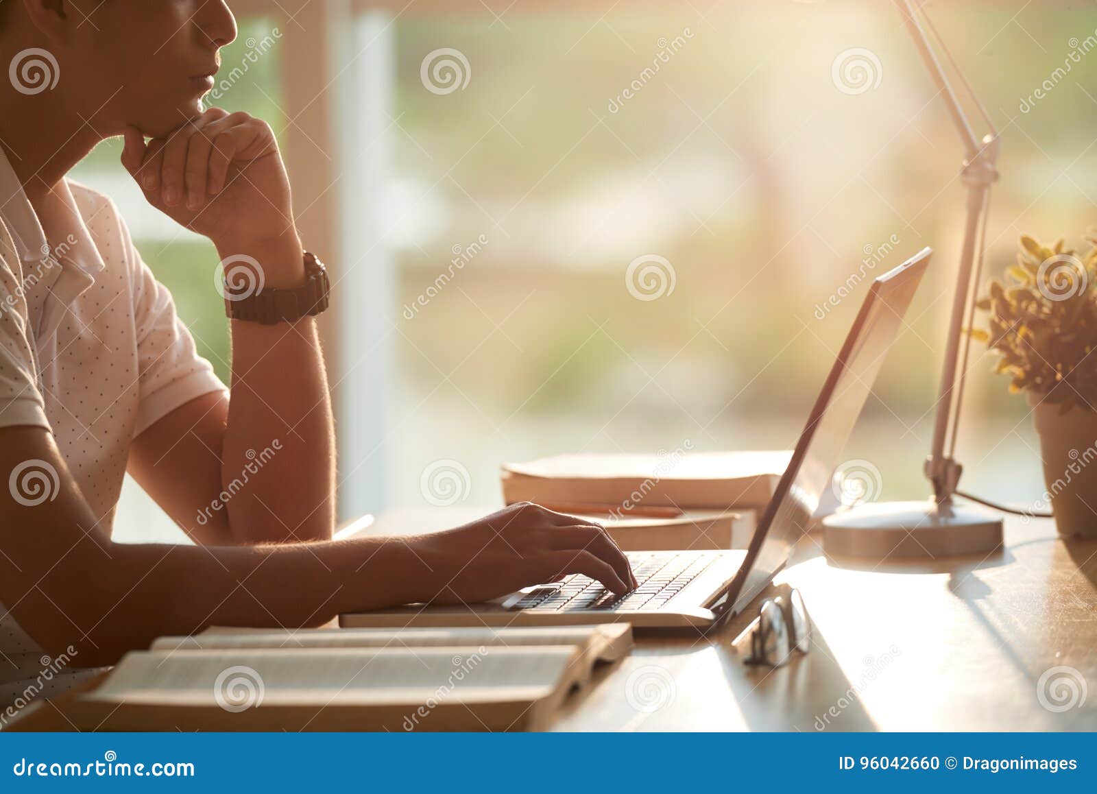 Student working on laptop stock photo. Image of university - 96042660
