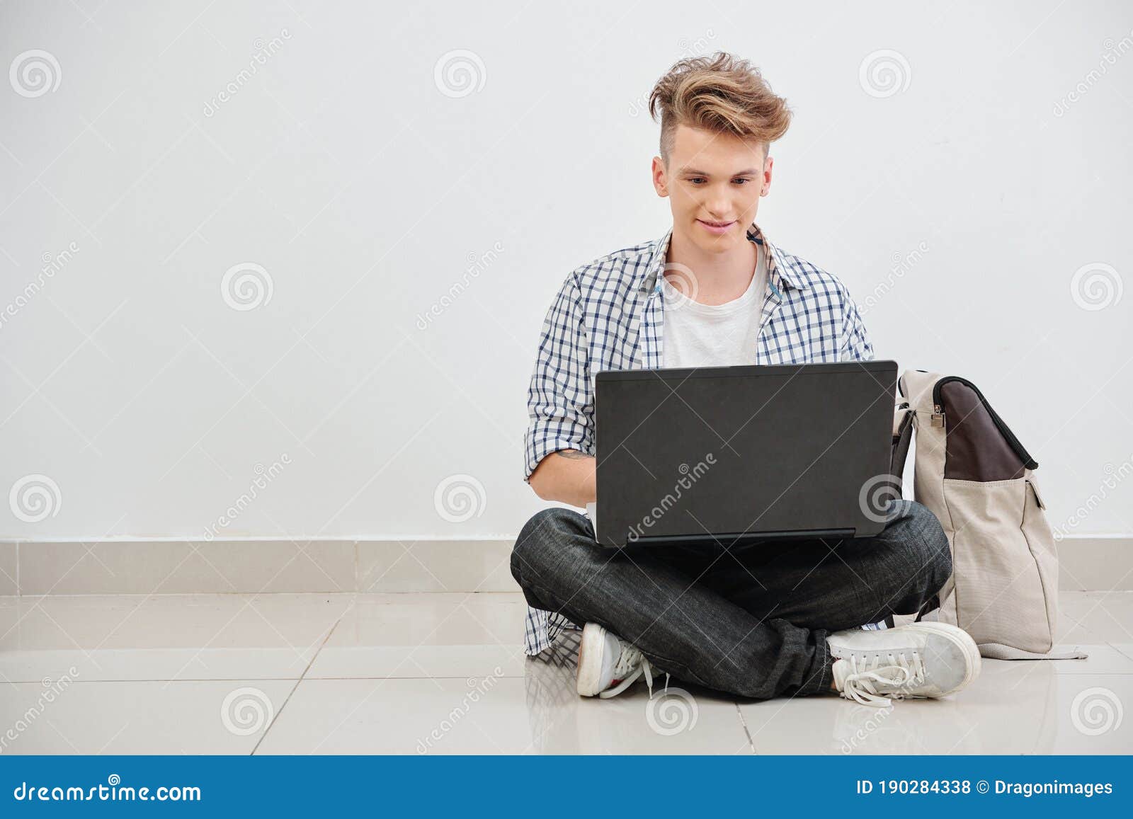 Student working on laptop stock photo. Image of studying - 190284338
