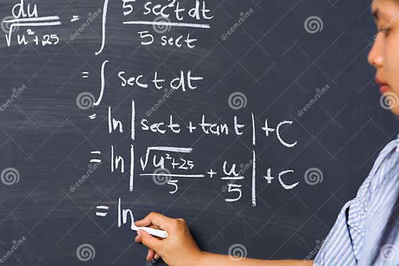 Student Working on Mathematics Problem Stock Photo - Image of school ...