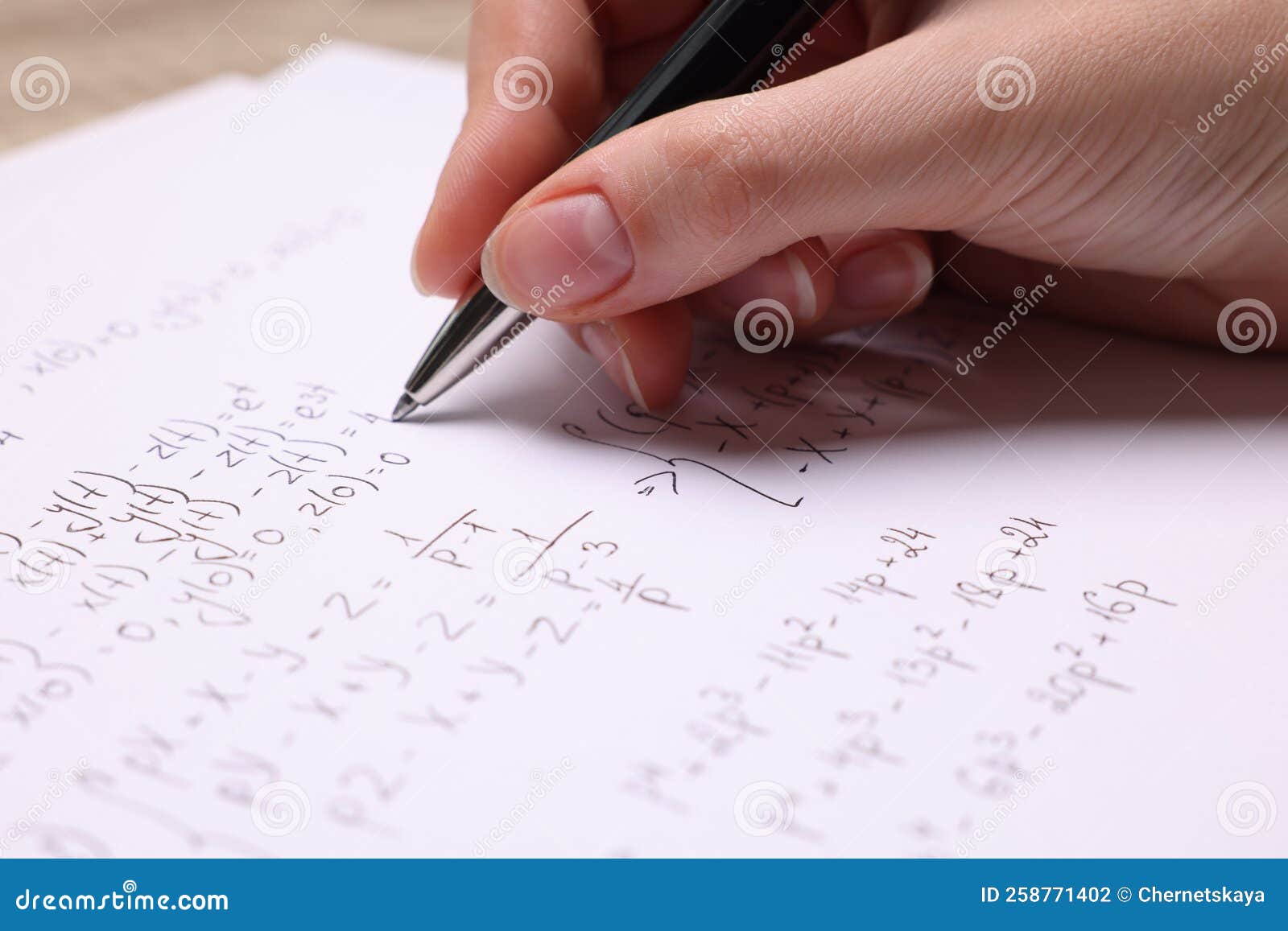 Student Writing Different Mathematical Formulas on Paper, Closeup Stock ...