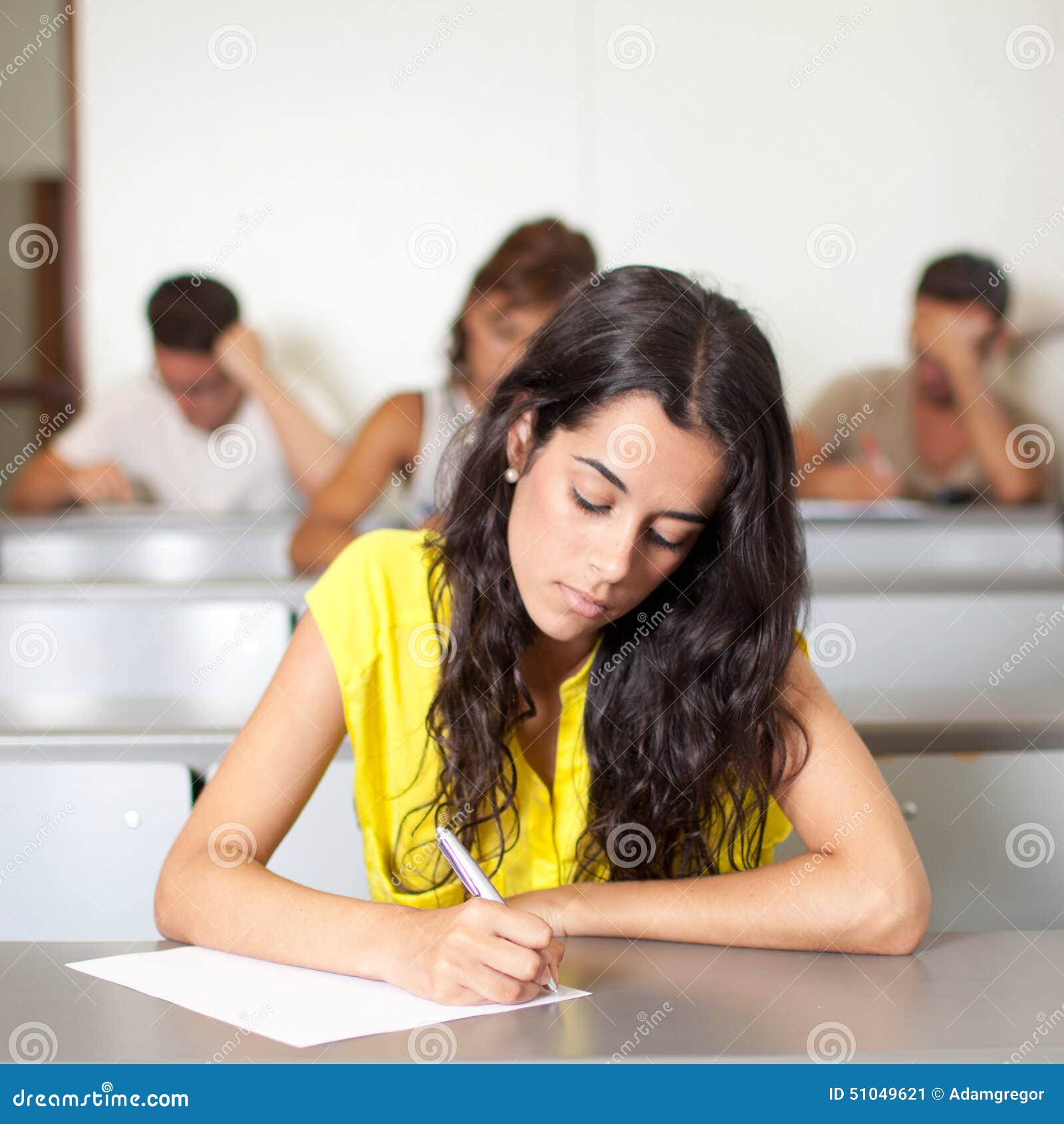 Student writing exam stock image. Image of shirt, shirts - 51049621