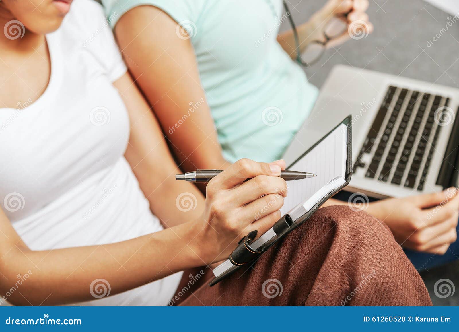 Student Writing Note on Her Book Stock Photo - Image of brown, laptop ...