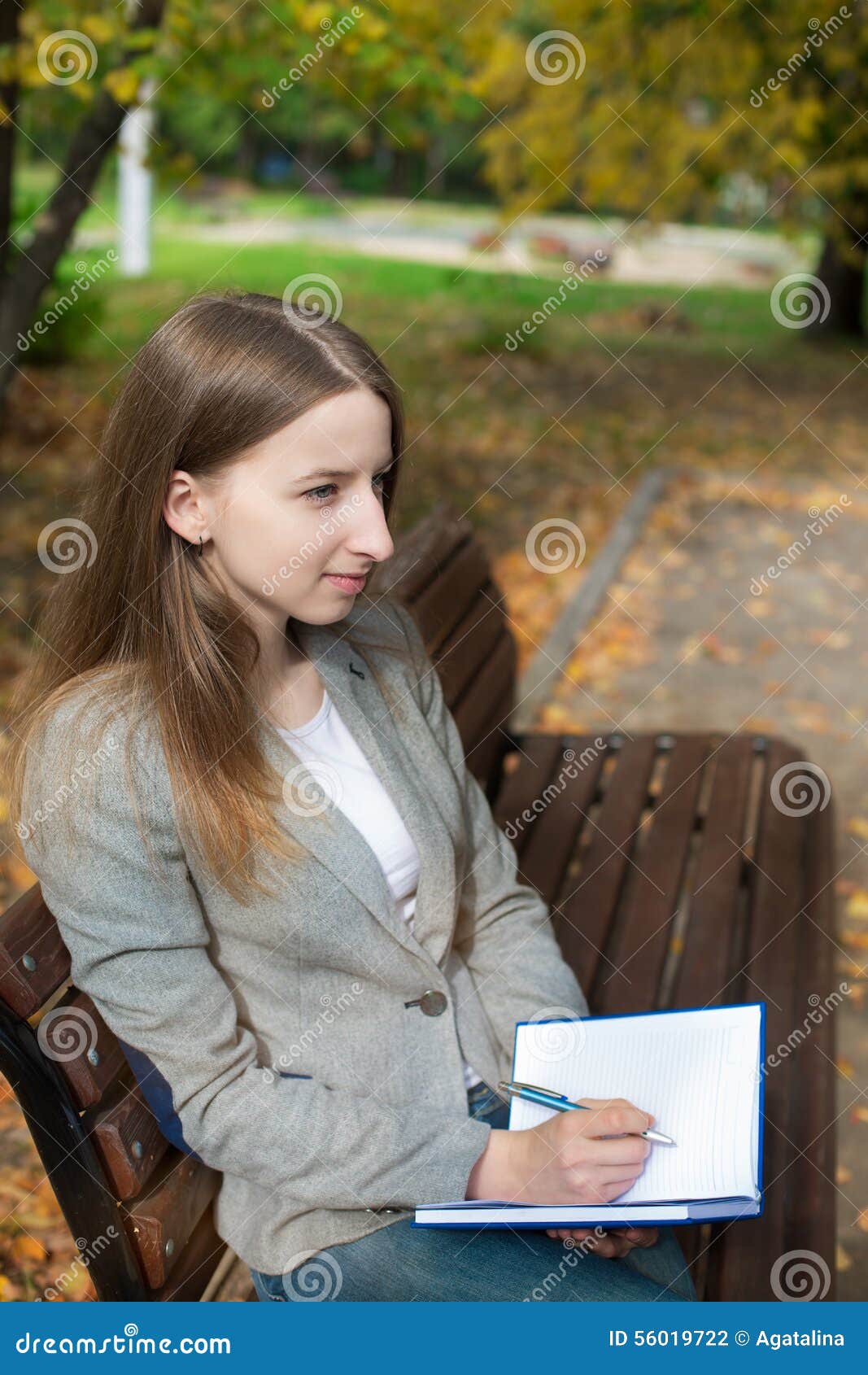 Student Writing in Notebook and Thinking Stock Photo - Image of high ...