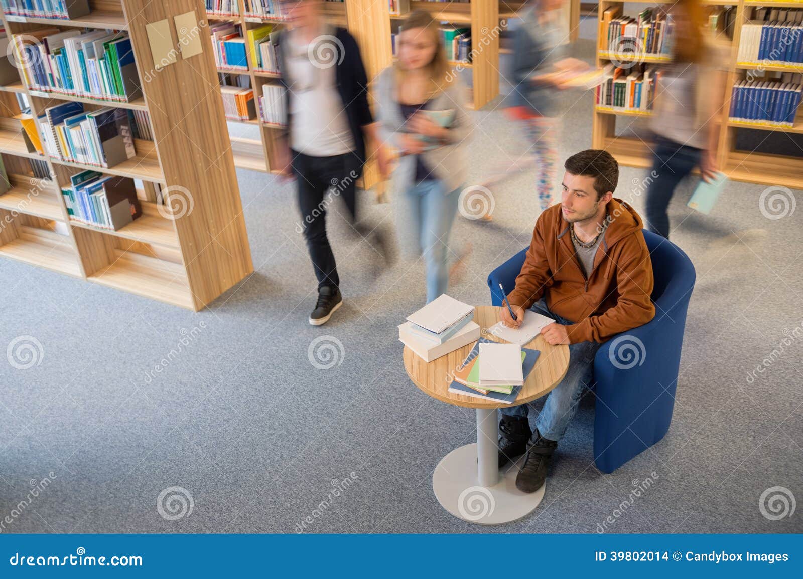 Student Writing Notes in Library Blur Motion Stock Photo - Image of ...