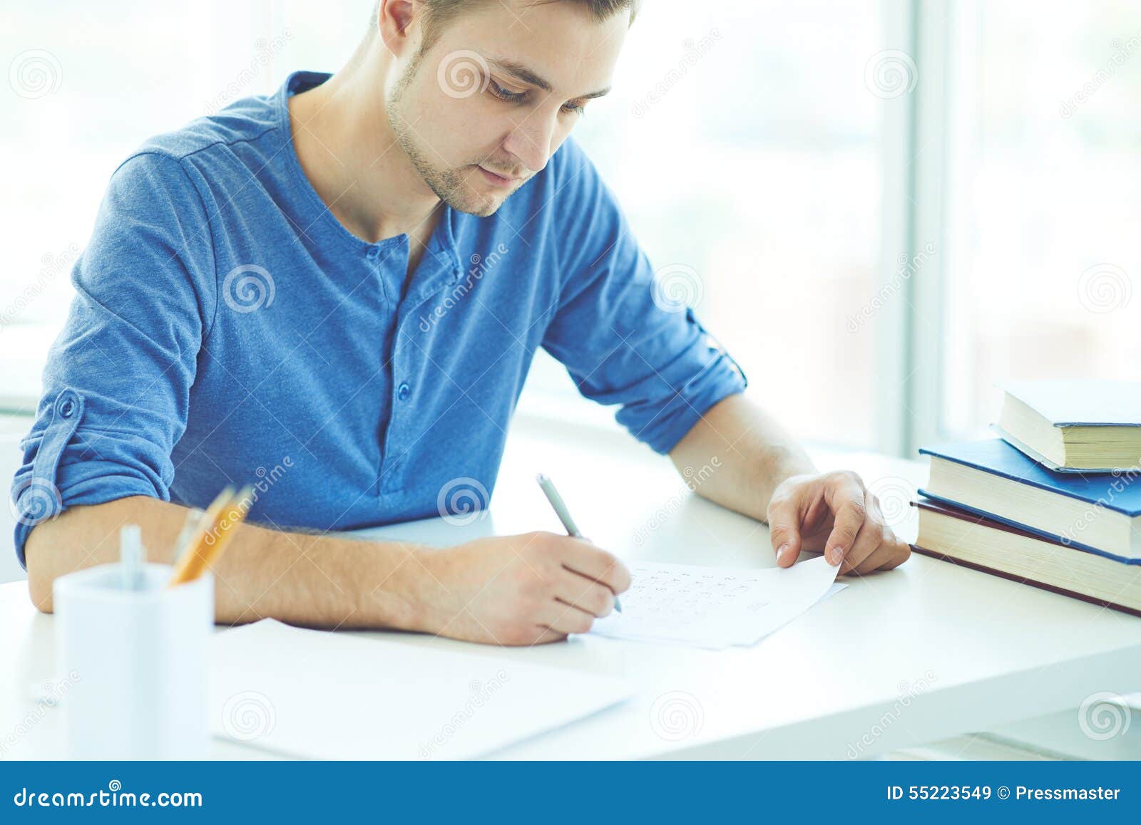 Student writing test stock image. Image of calm, highschool - 55223549