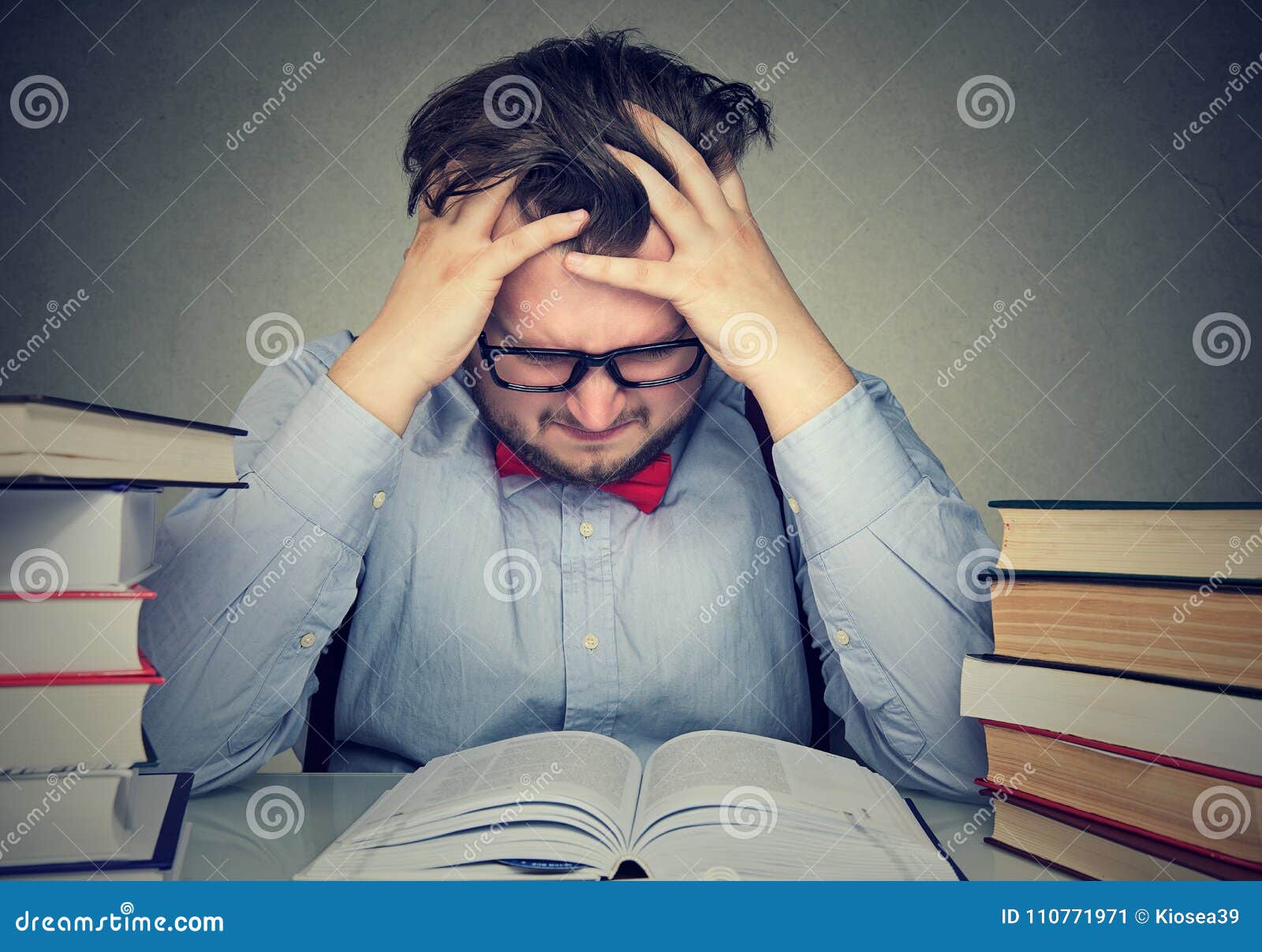 Student Young Man with Desperate Expression Looking at Books Stock ...