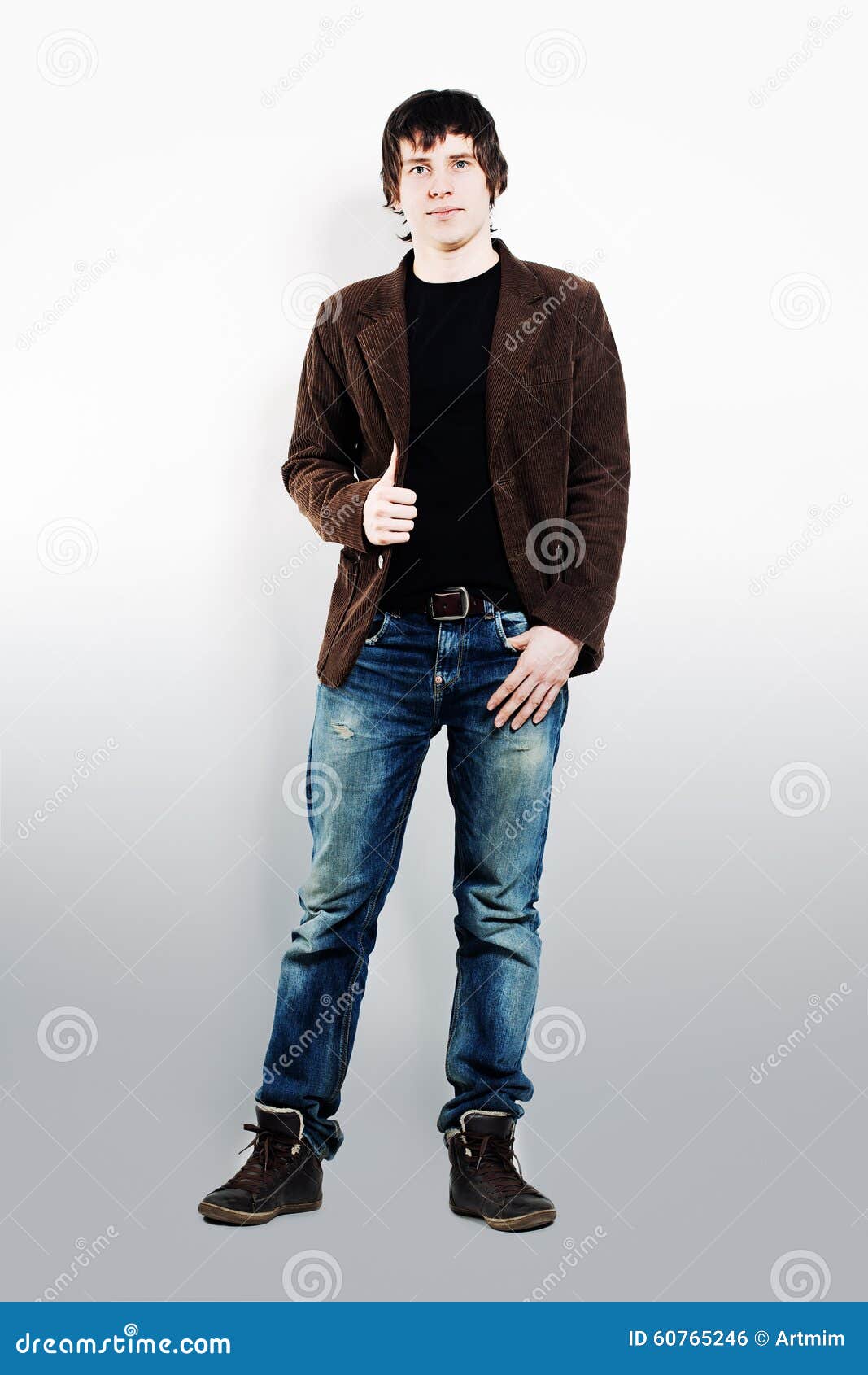 Student. Young Man Standing Stock Photo - Image of clothing, jeans ...