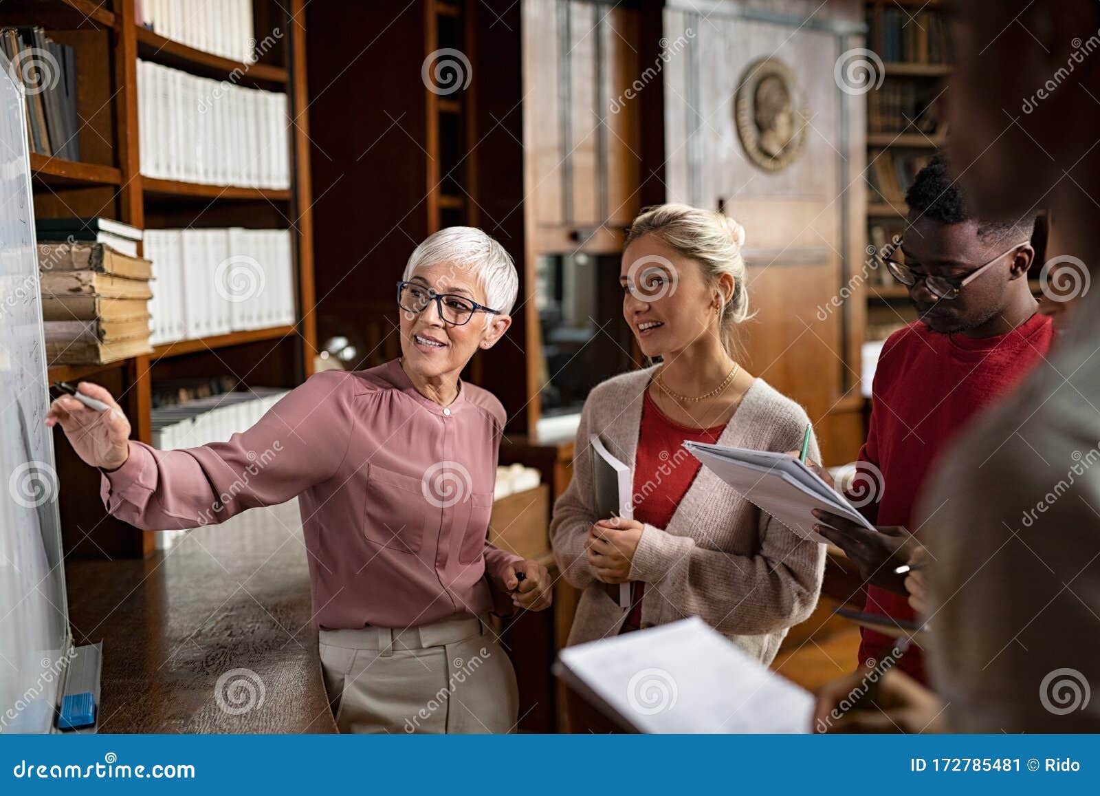 Students Asking Doubts To Professor Stock Image - Image of teacher ...