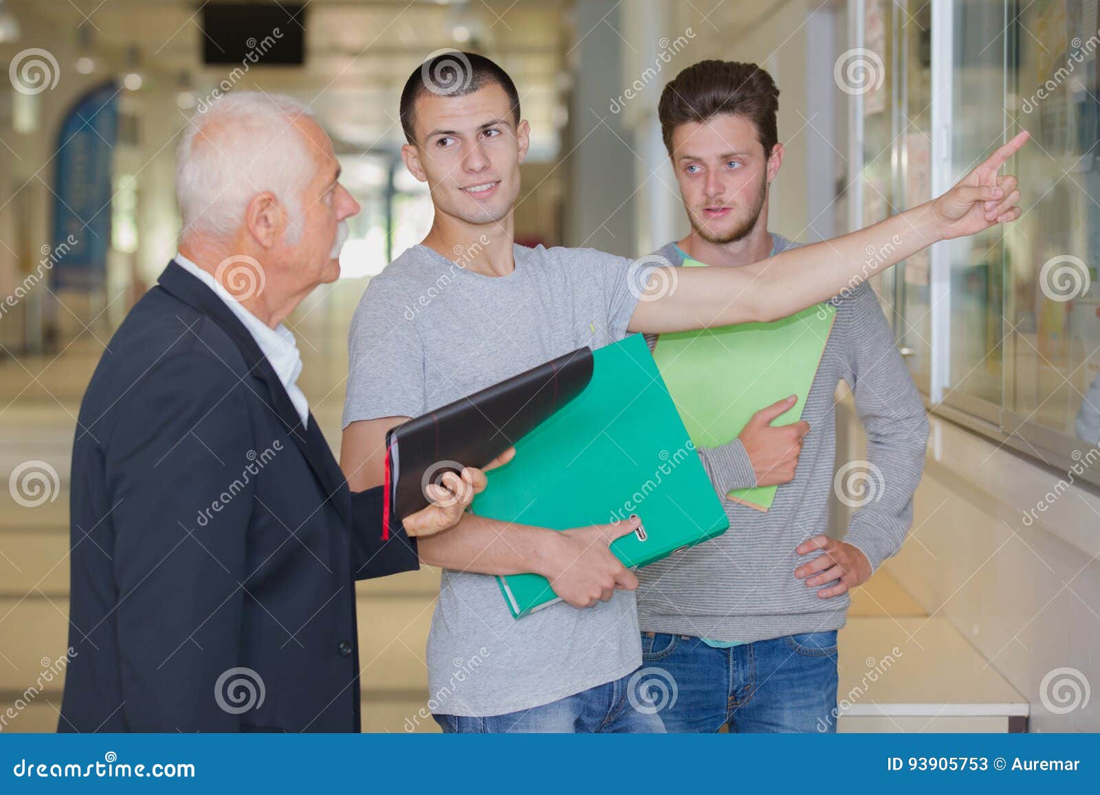 Students Asking Female Professor For Help At An Informatics Lecture ...