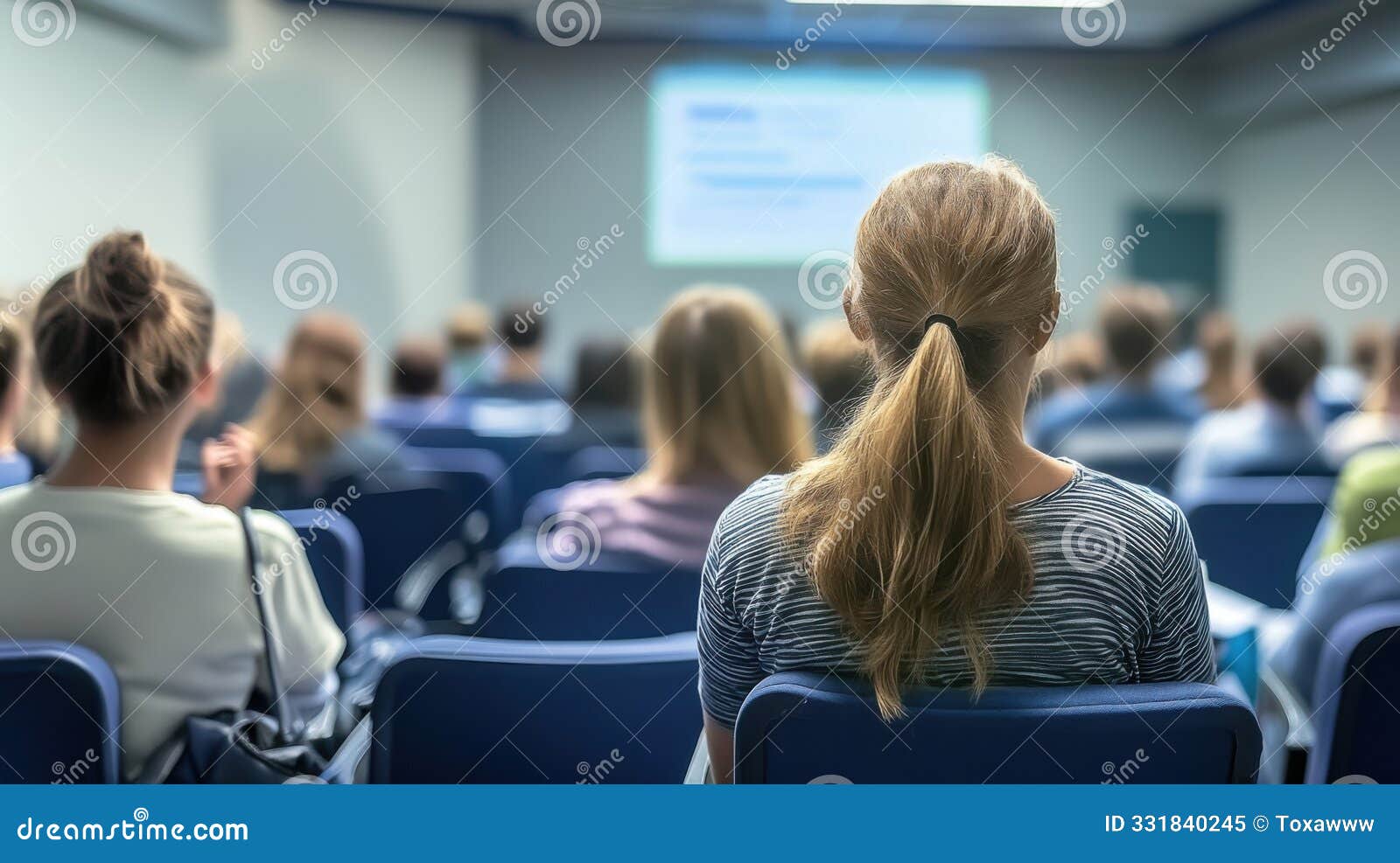 Students Attending Lecture in a Classroom Setting with Focus on ...