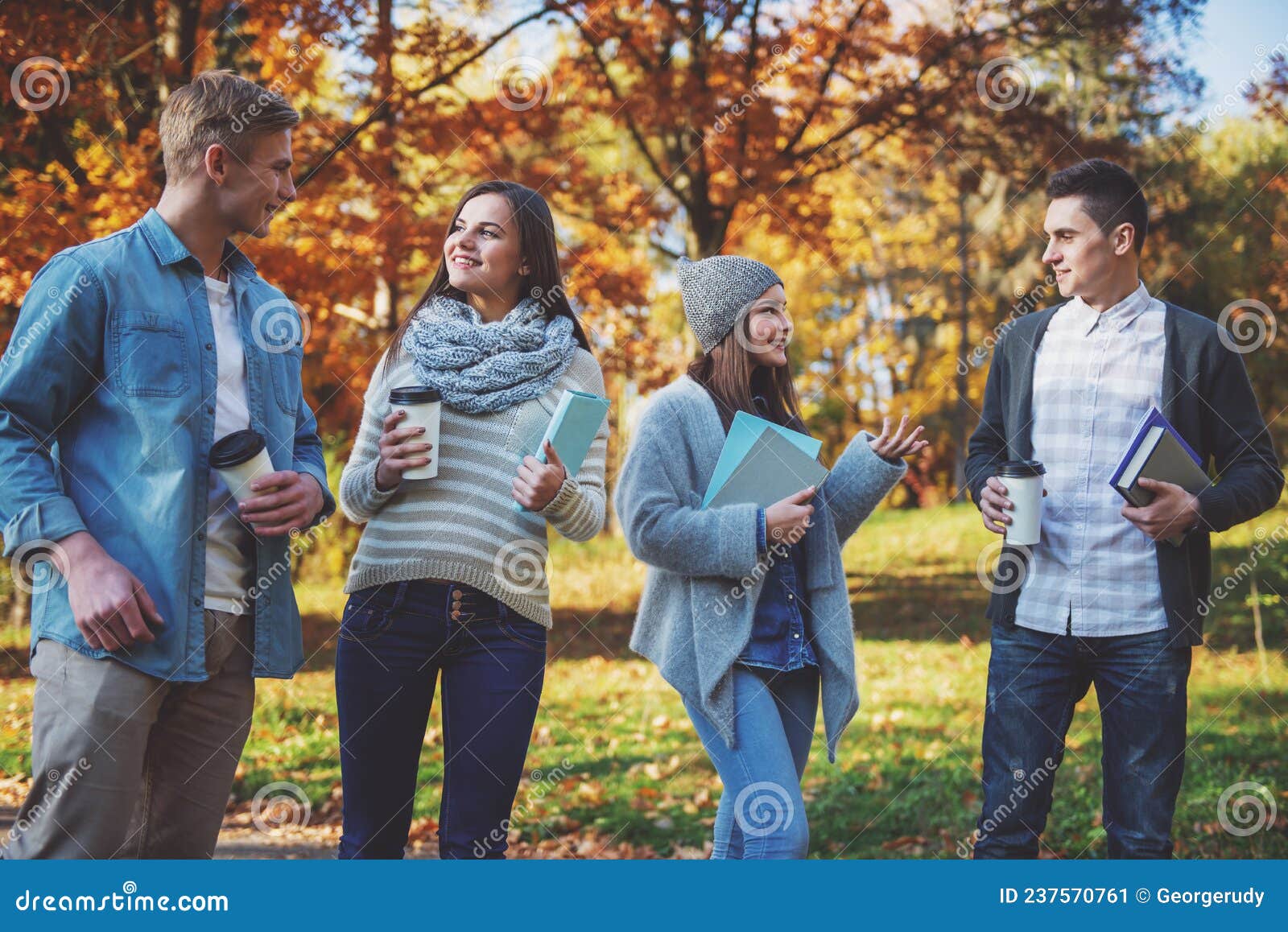 Students in autumn park stock image. Image of lifestyle - 237570761