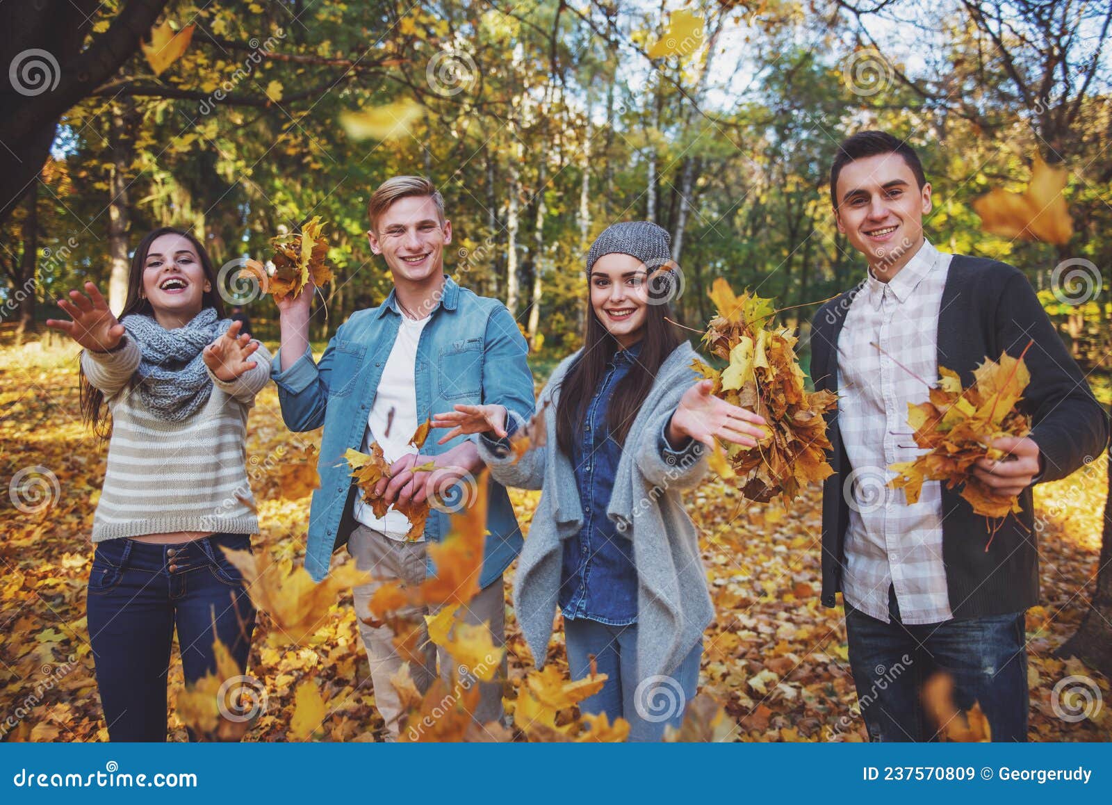 Students in autumn park stock image. Image of autumn - 237570809