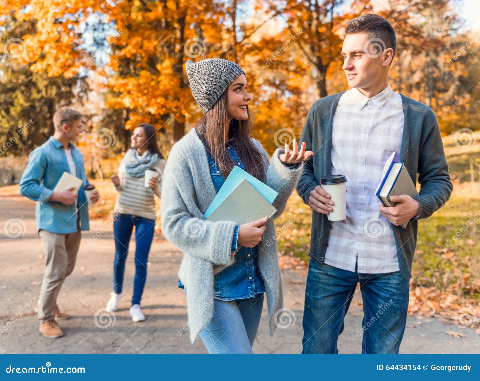 Students in autumn park stock photo. Image of class, autumn - 64434154