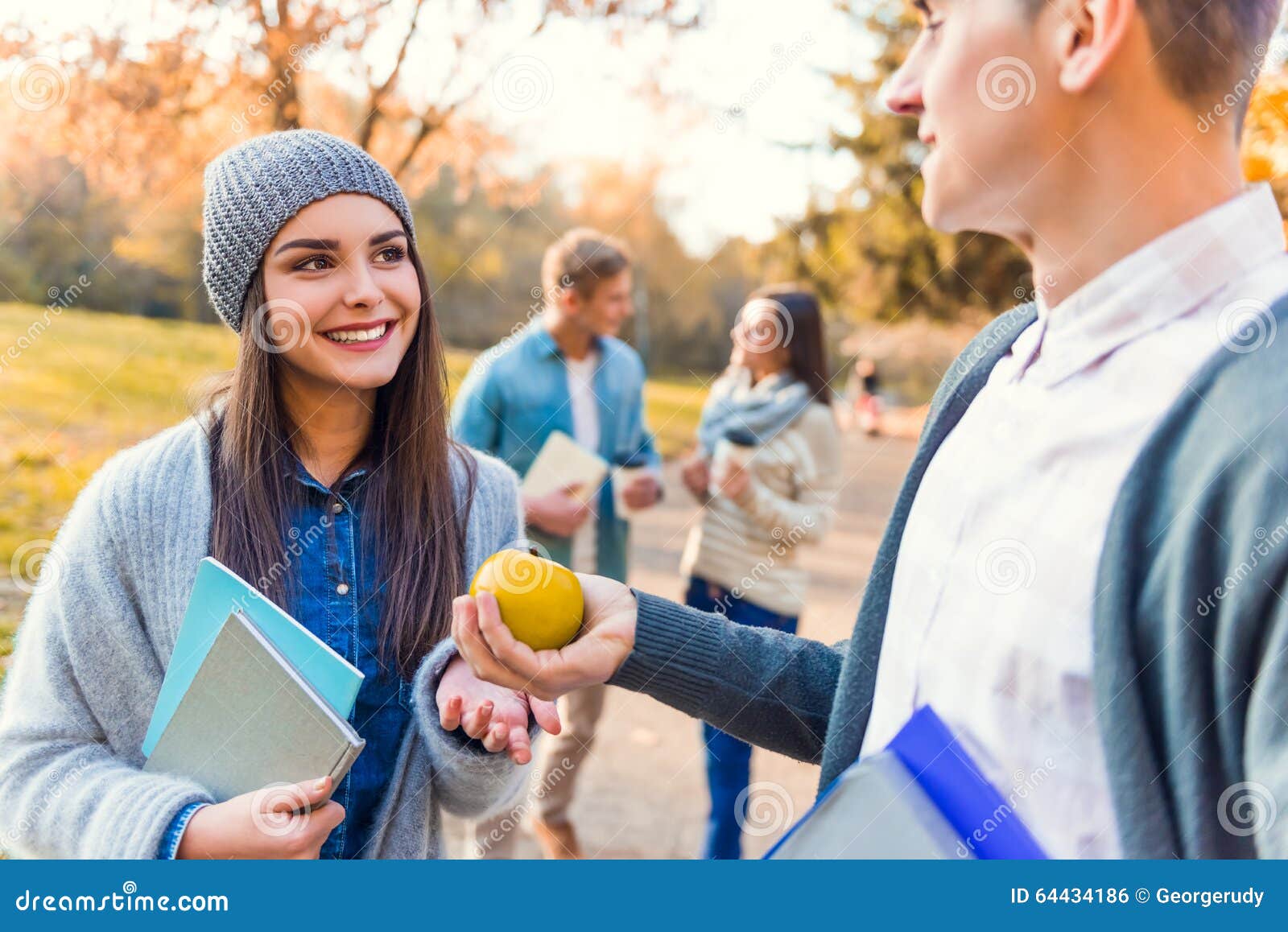 Students in autumn park stock photo. Image of lifestyle - 64434186